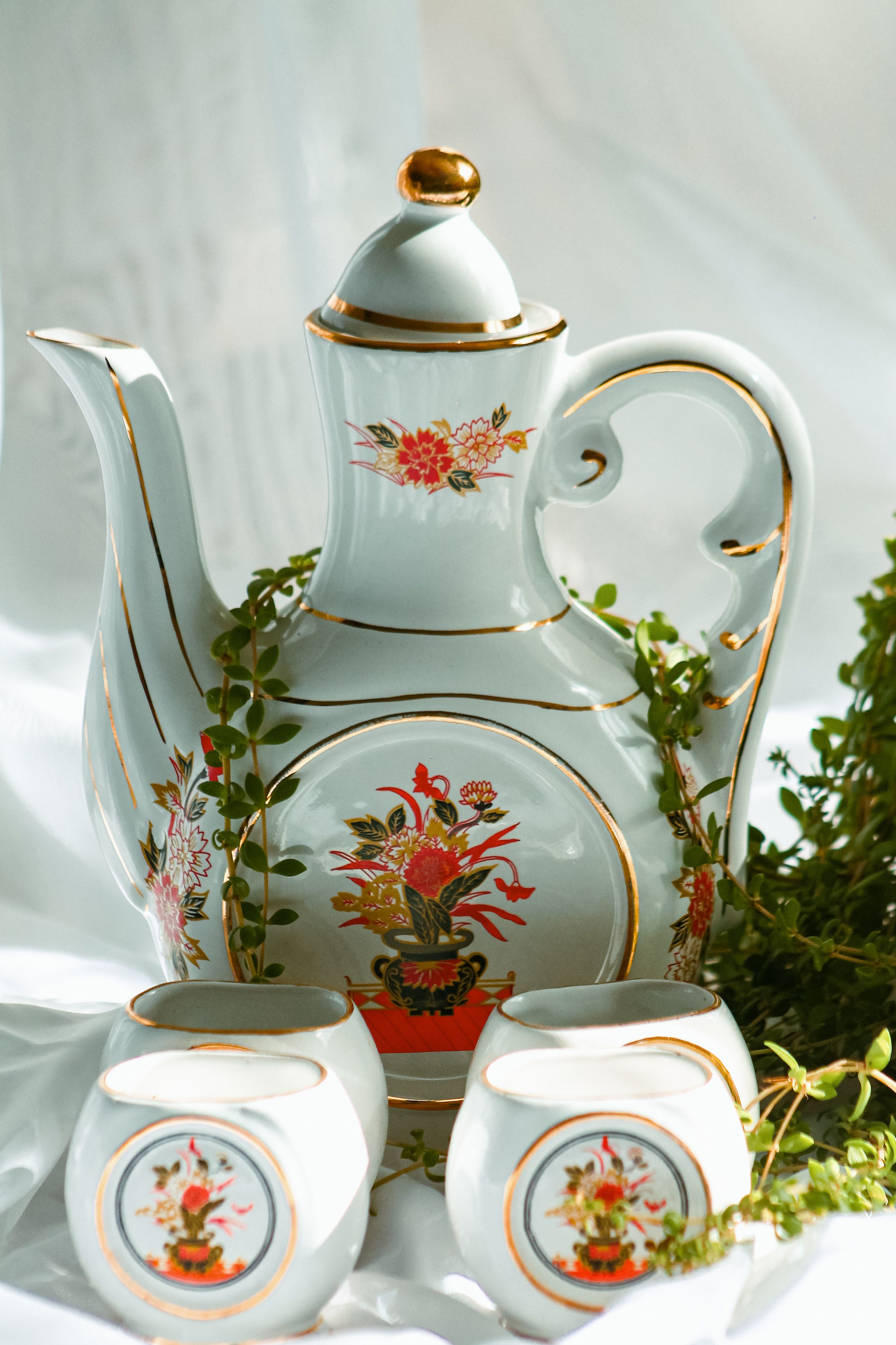 Porcelain Teapot and Cup of Tea · Free Stock Photo