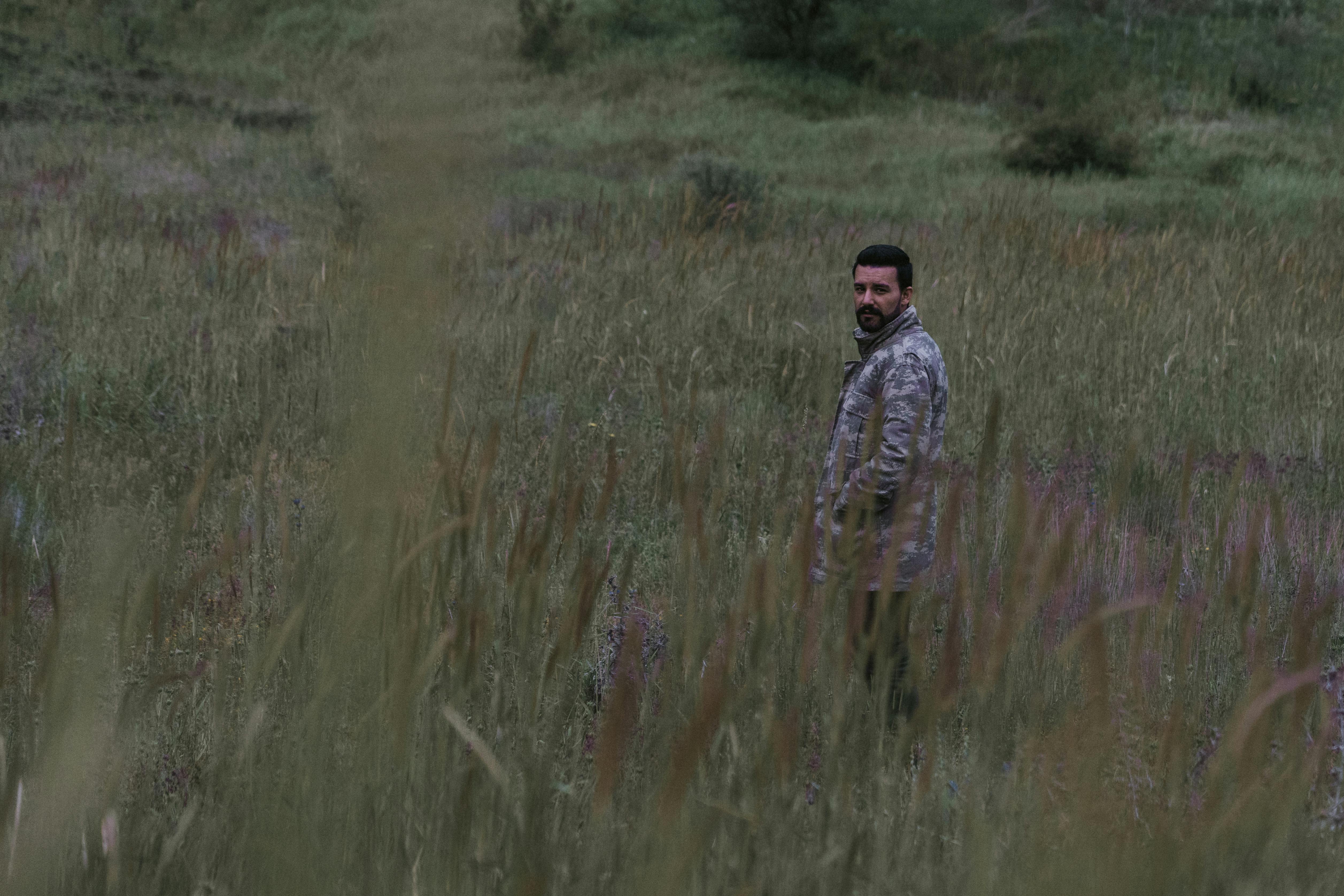 Man Standing in a Field · Free Stock Photo