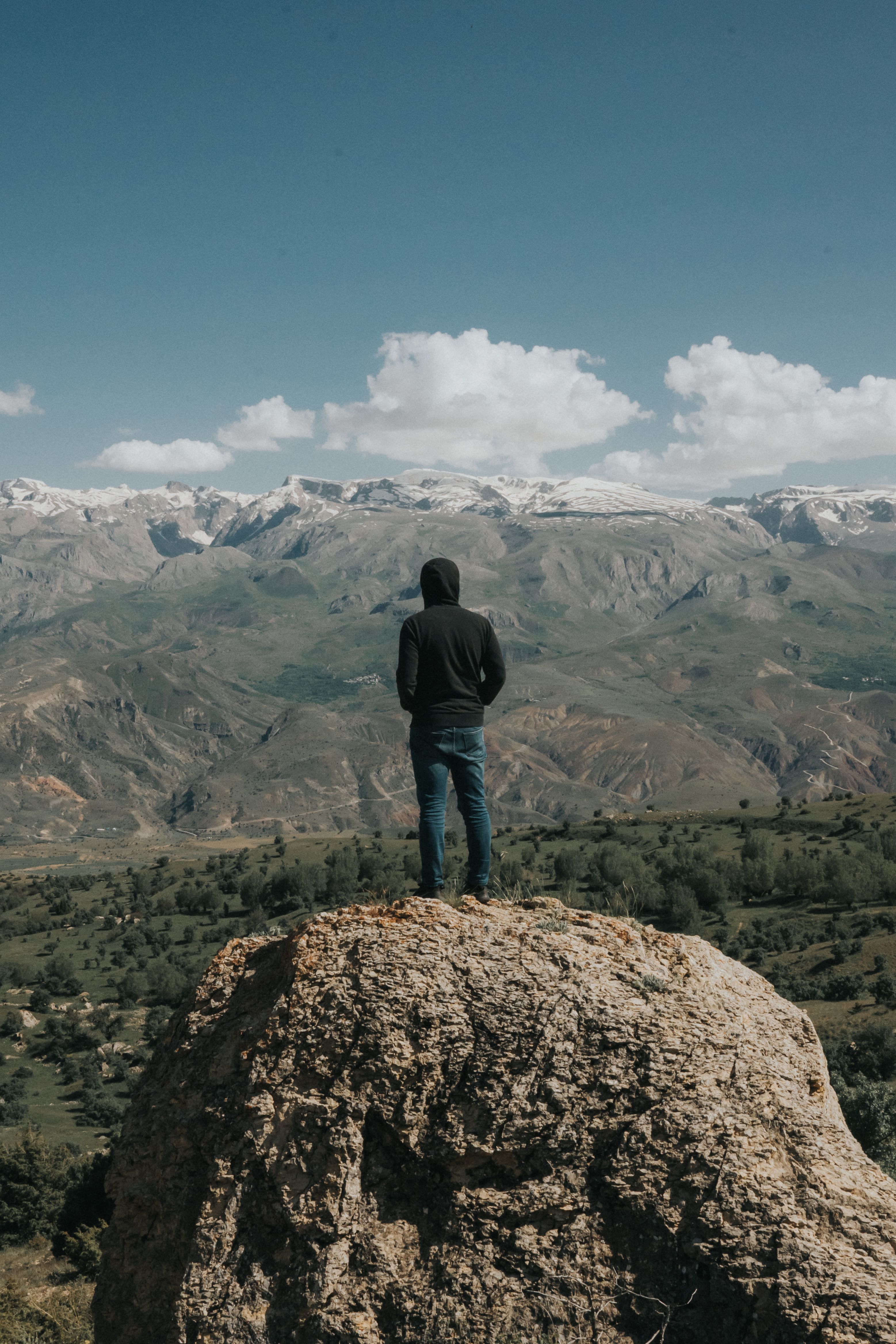 Man Standing on the Hill and Looking at the View of Mountains · Free ...