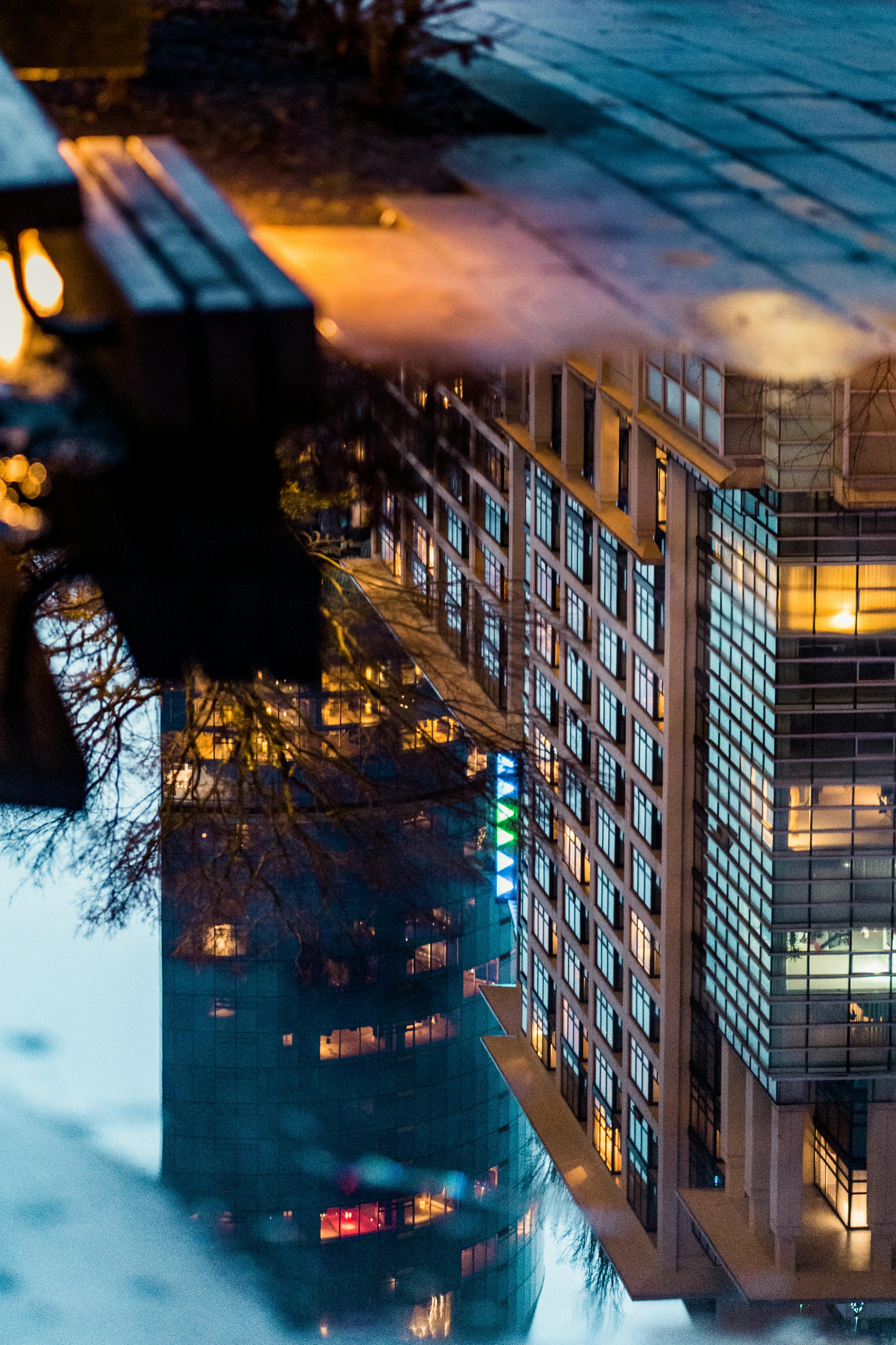 Water Reflection of High-rise Building · Free Stock Photo