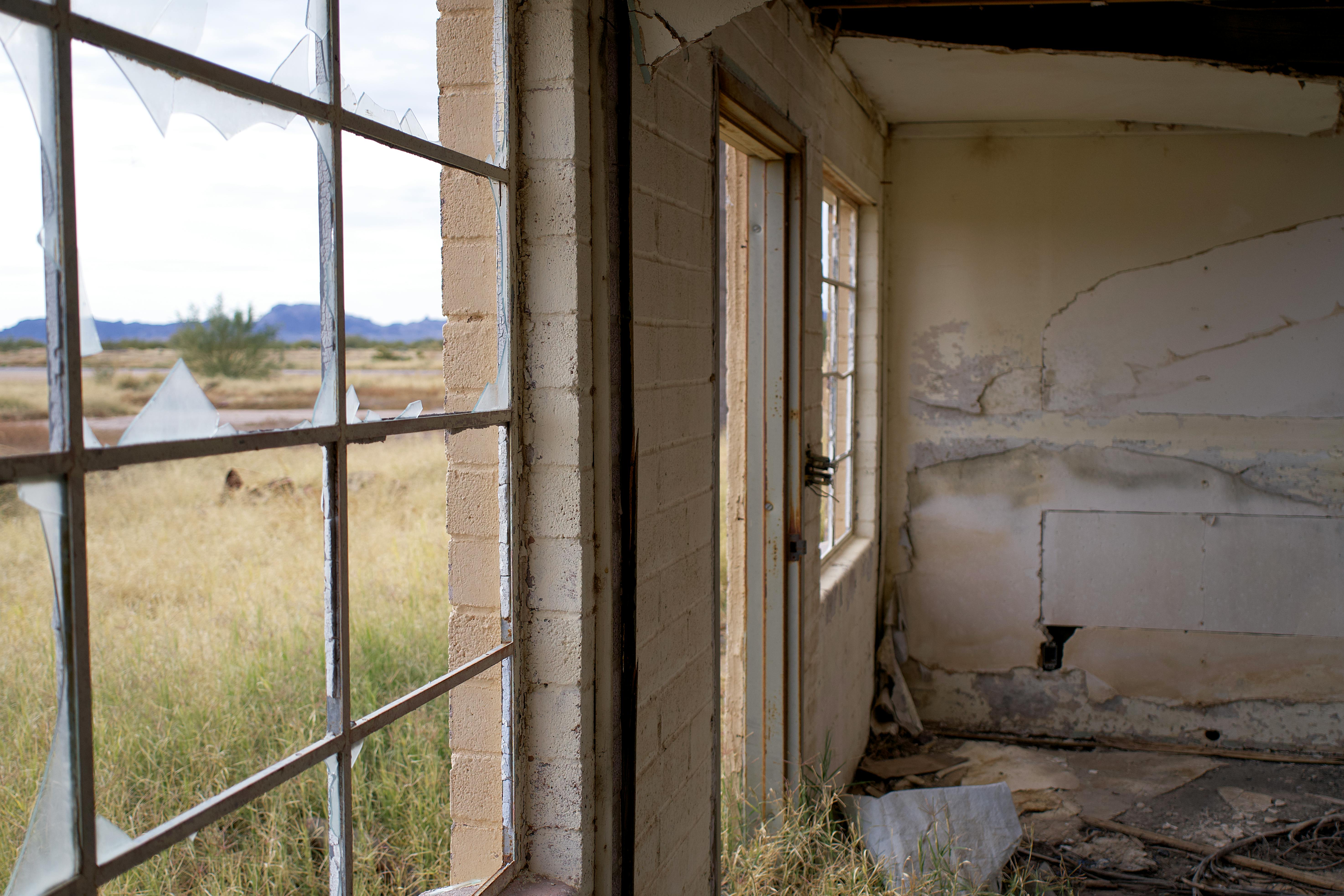 Paneled Window of Broken House · Free Stock Photo