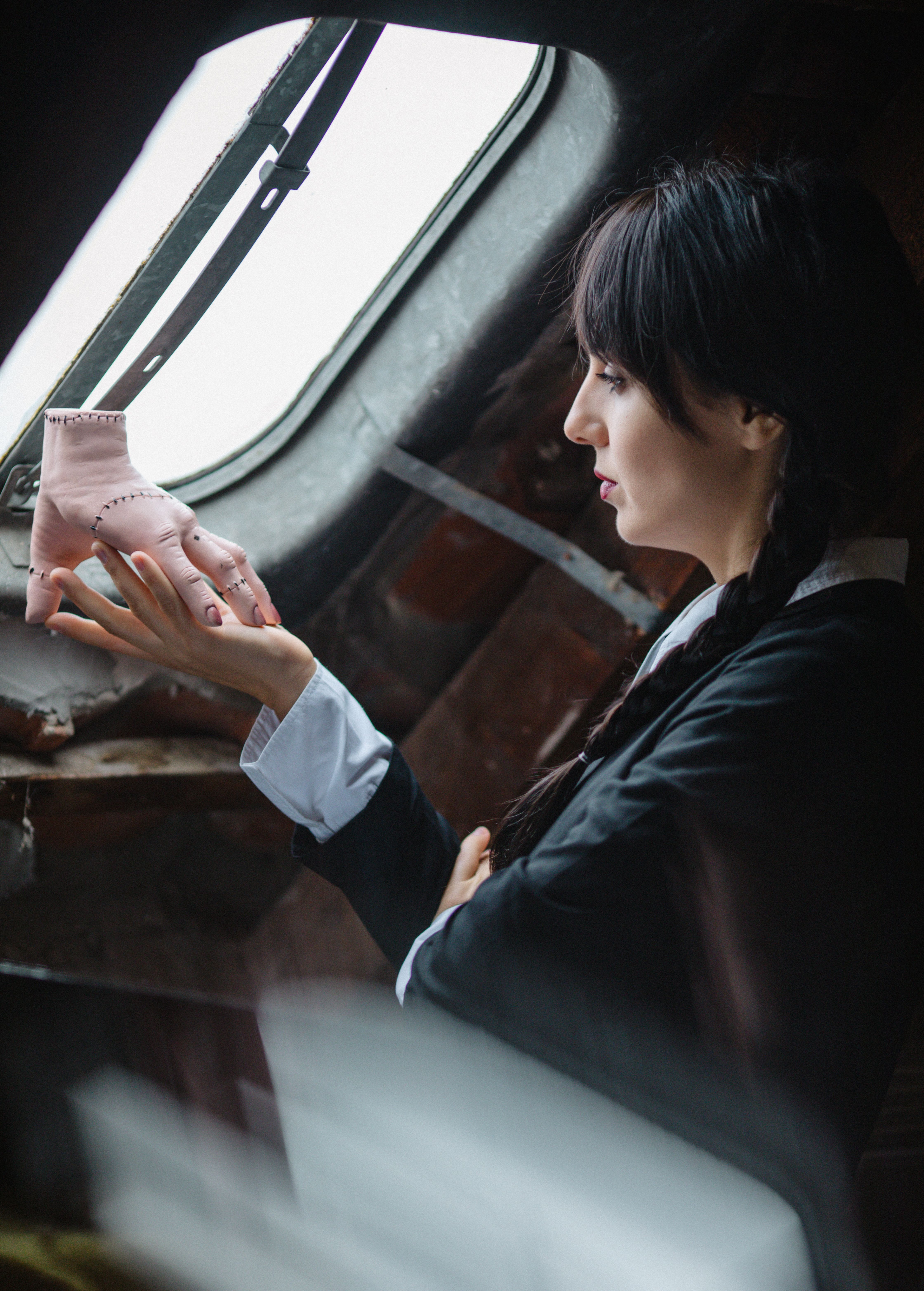 Girl in the Wednesday Addams Costume Standing by the Window · Free ...