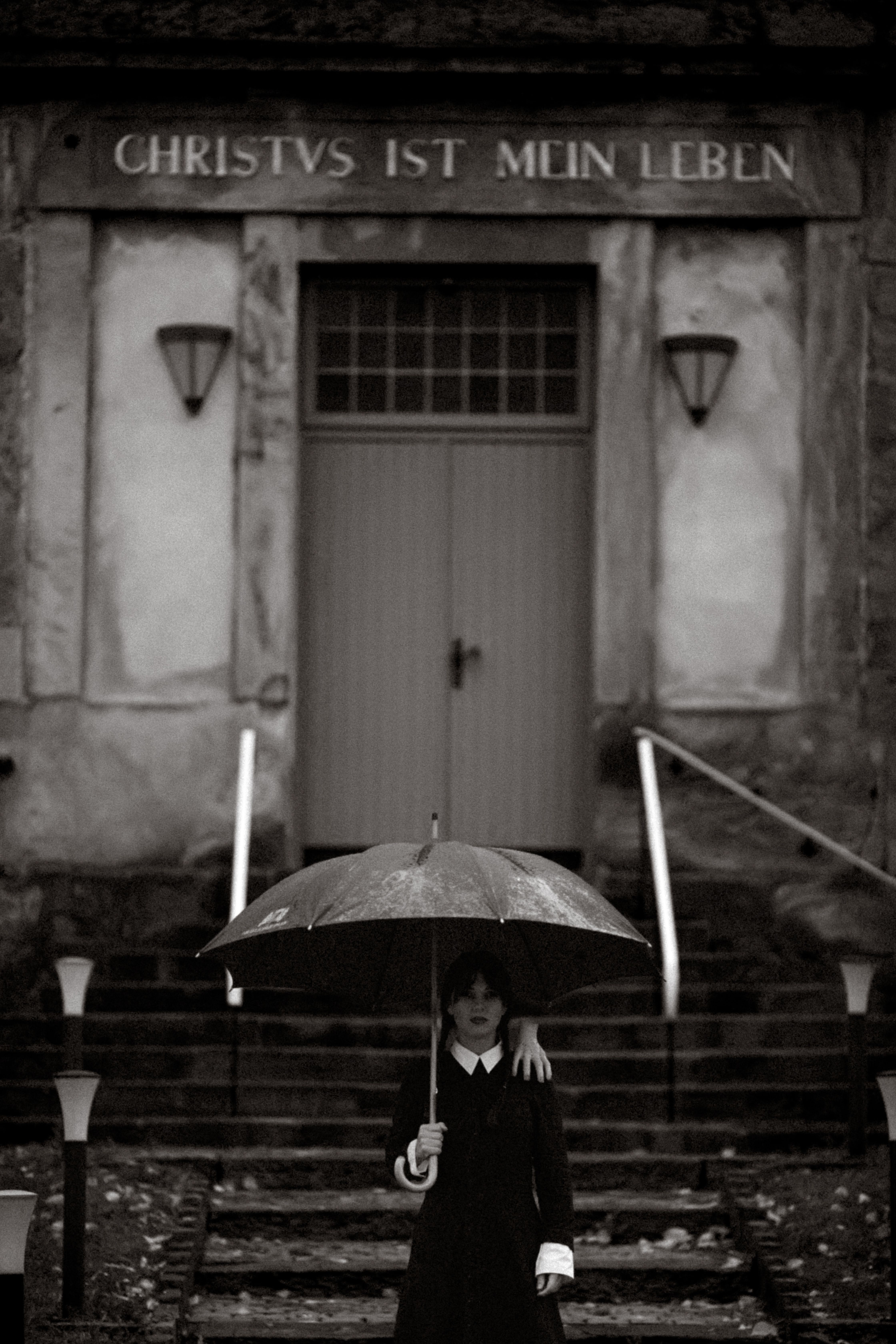 Wednesday Addams with Thing under Umbrella · Free Stock Photo