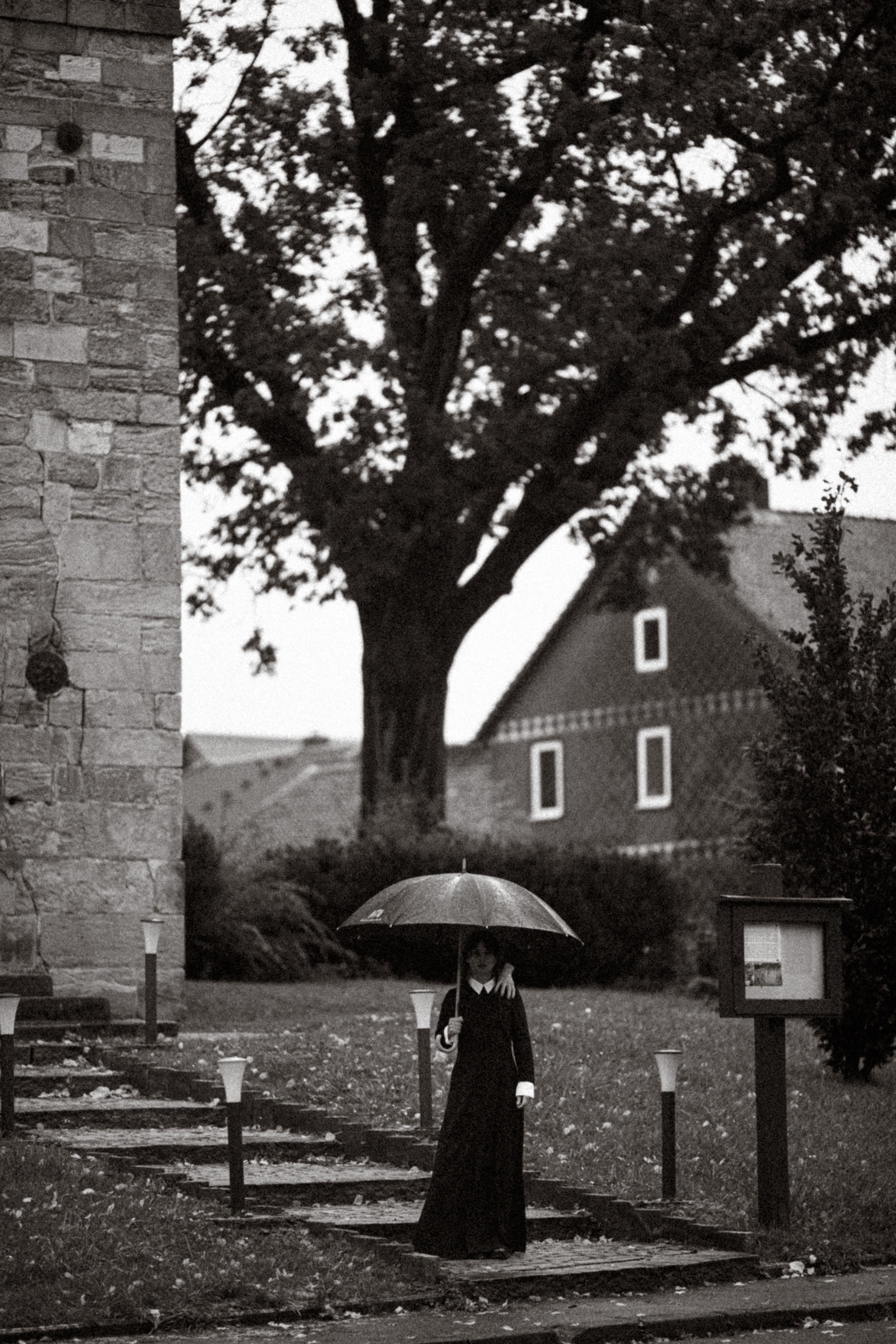 Creepy Wednesday Addams with Thing on Shoulder under Umbrella · Free ...