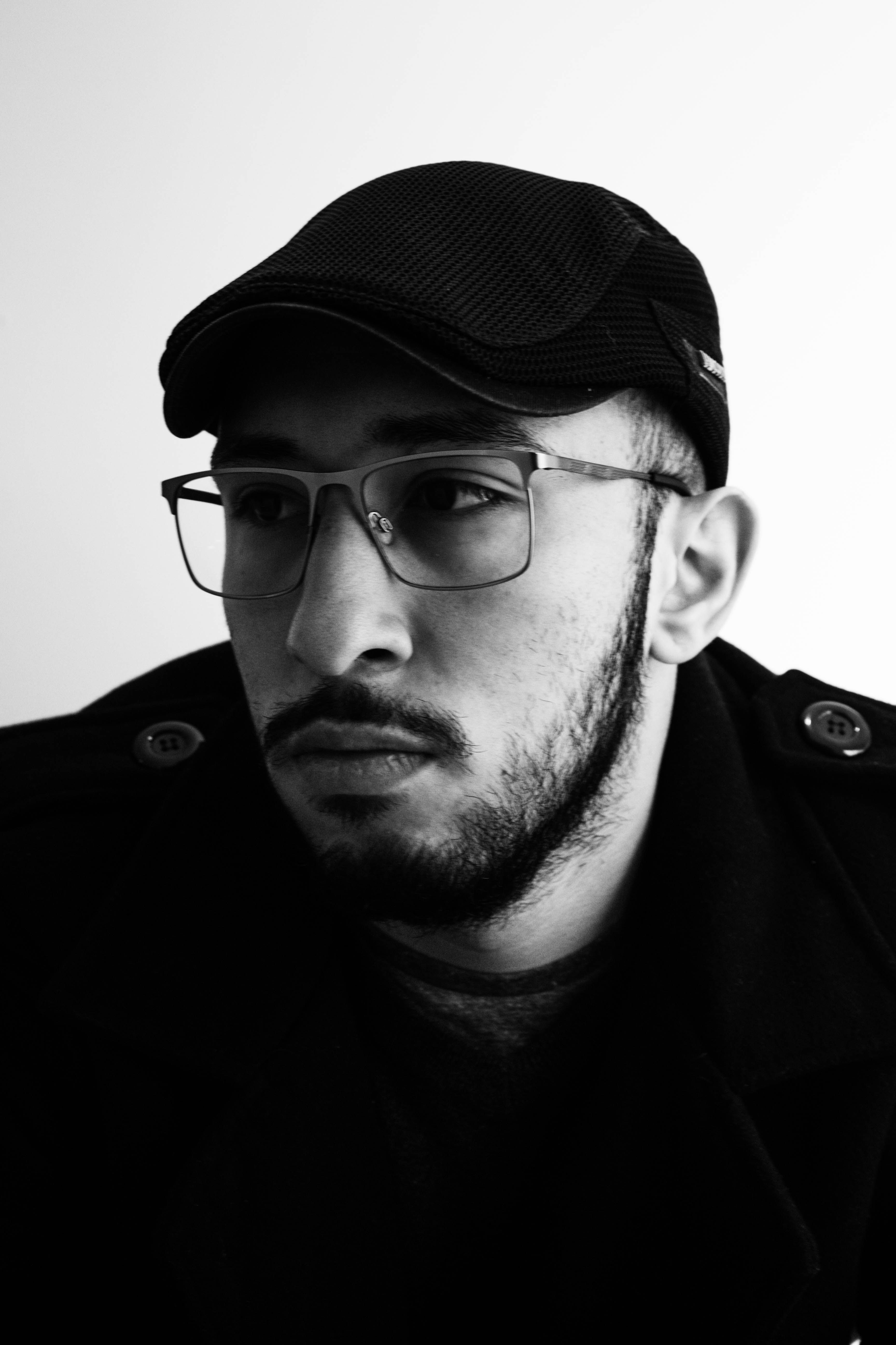 Man with a Beard Wearing a Cap · Free Stock Photo