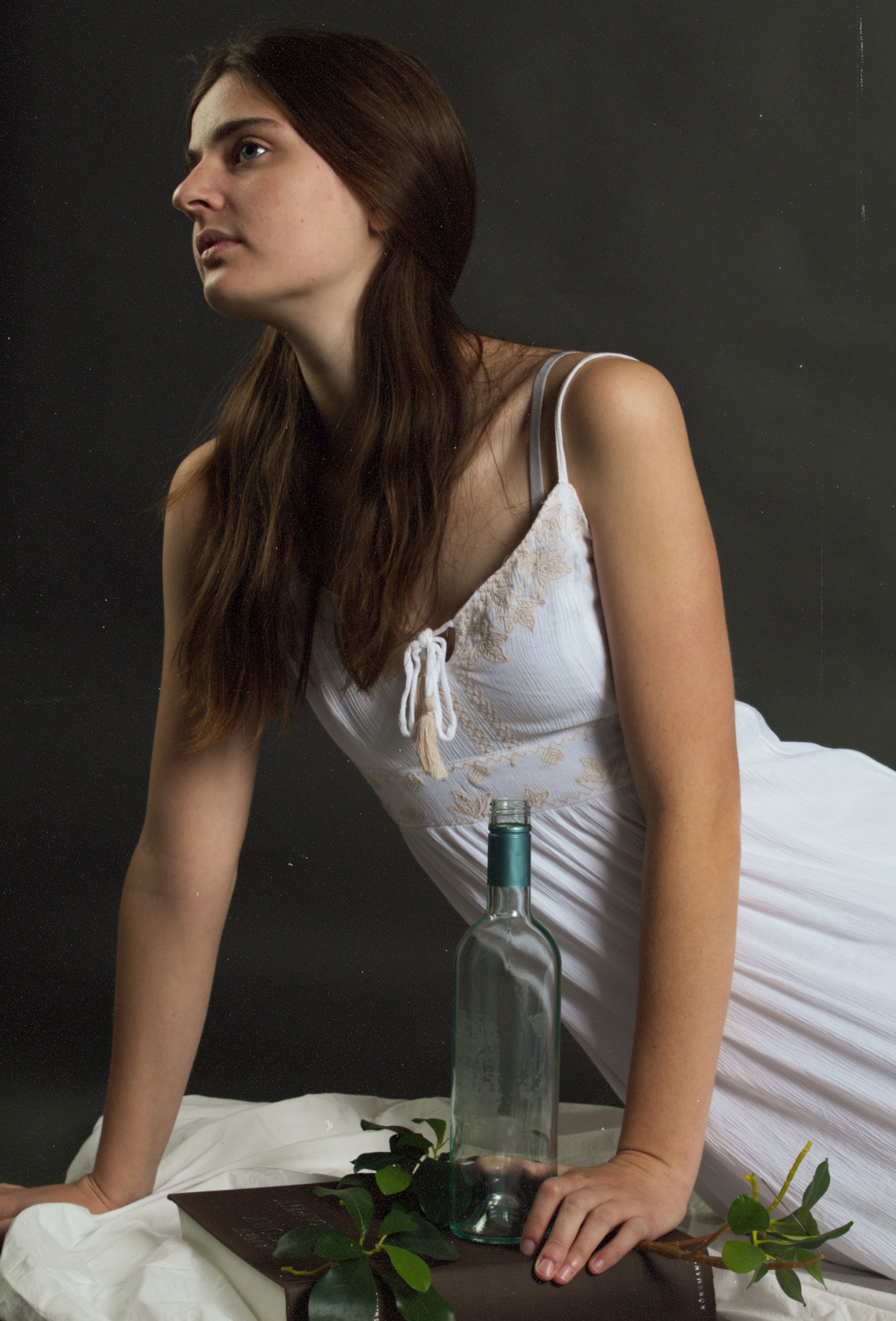 Bending Woman in White Dress · Free Stock Photo