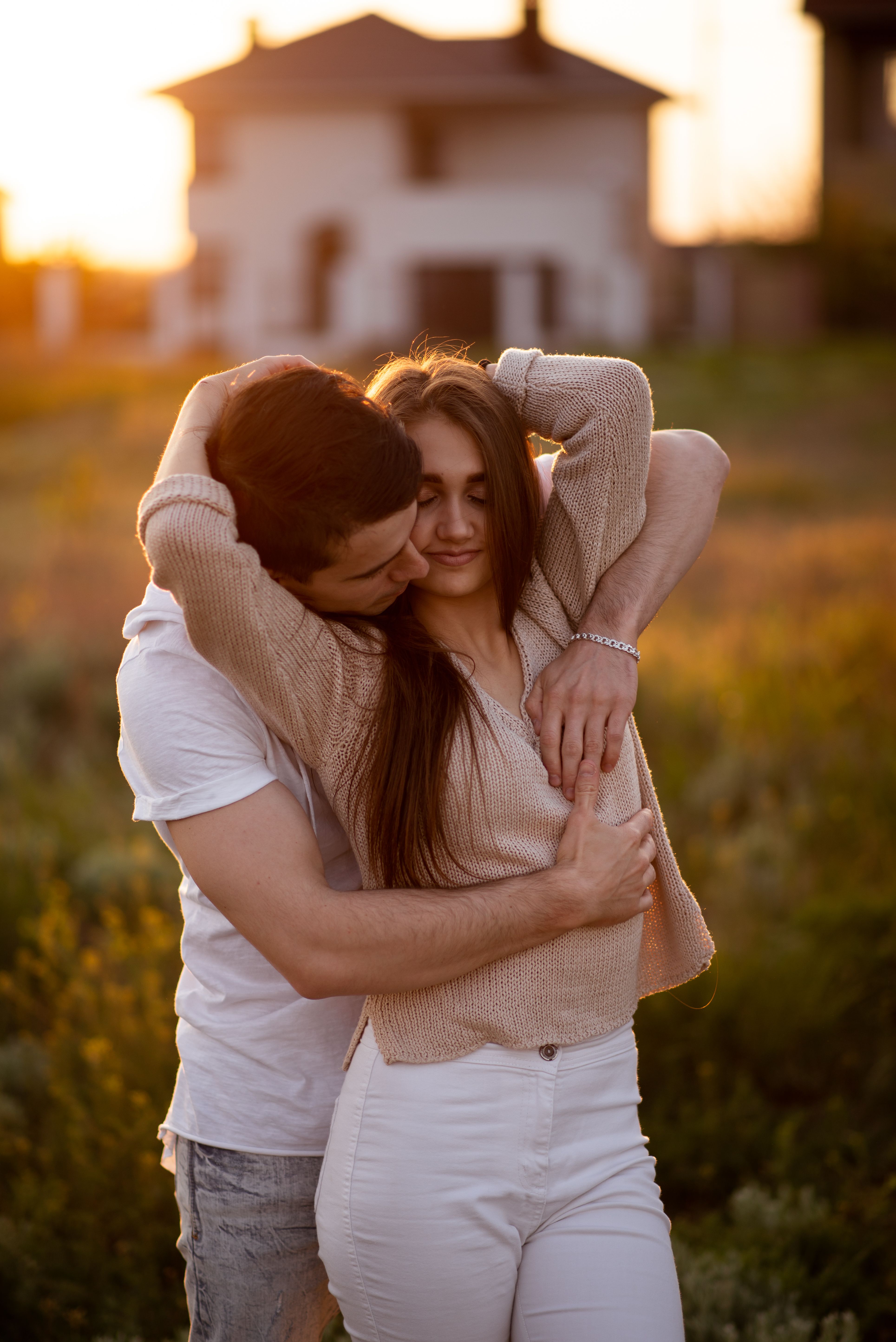 Couple Hugging at Sunset · Free Stock Photo
