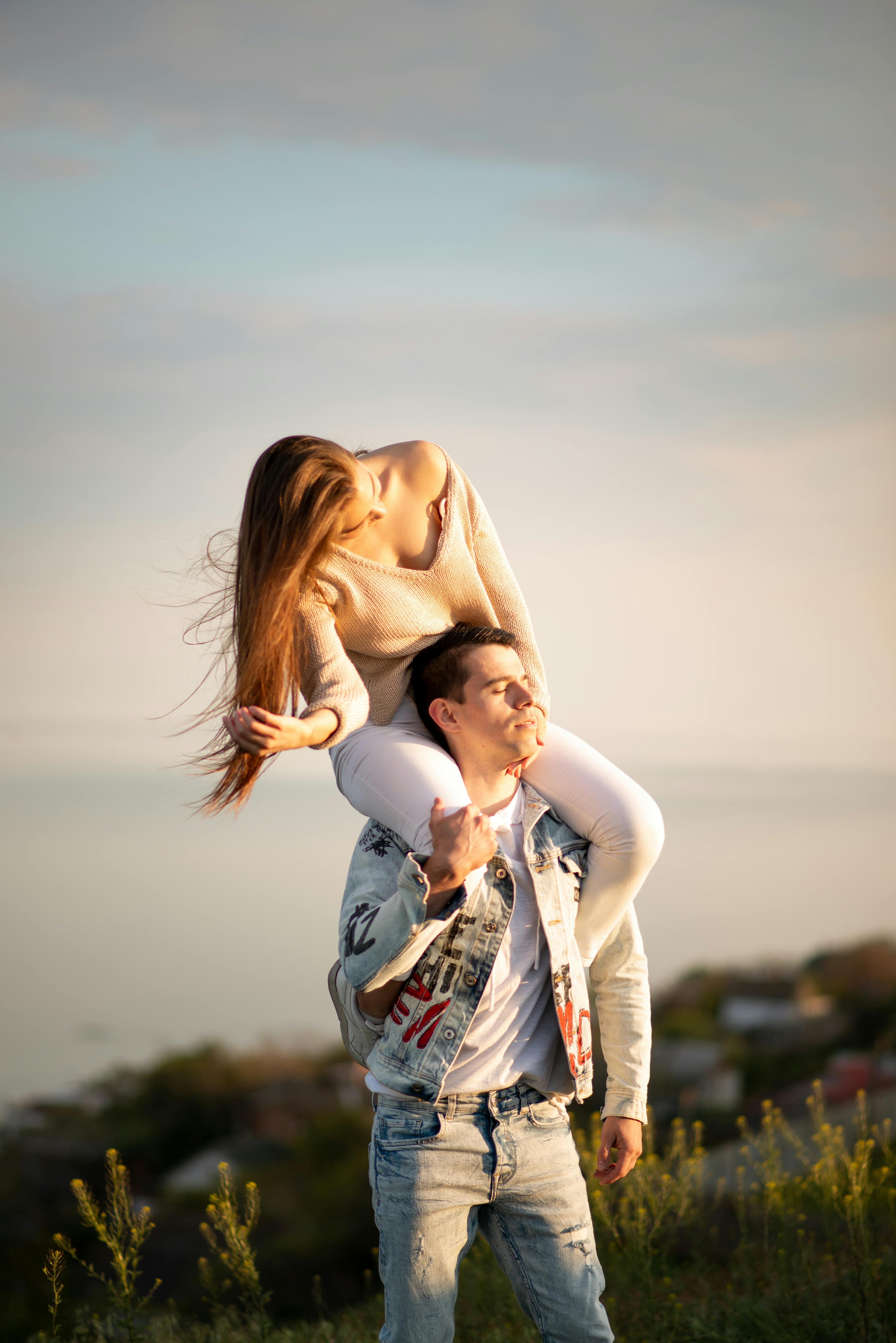 Woman Sitting on Man · Free Stock Photo