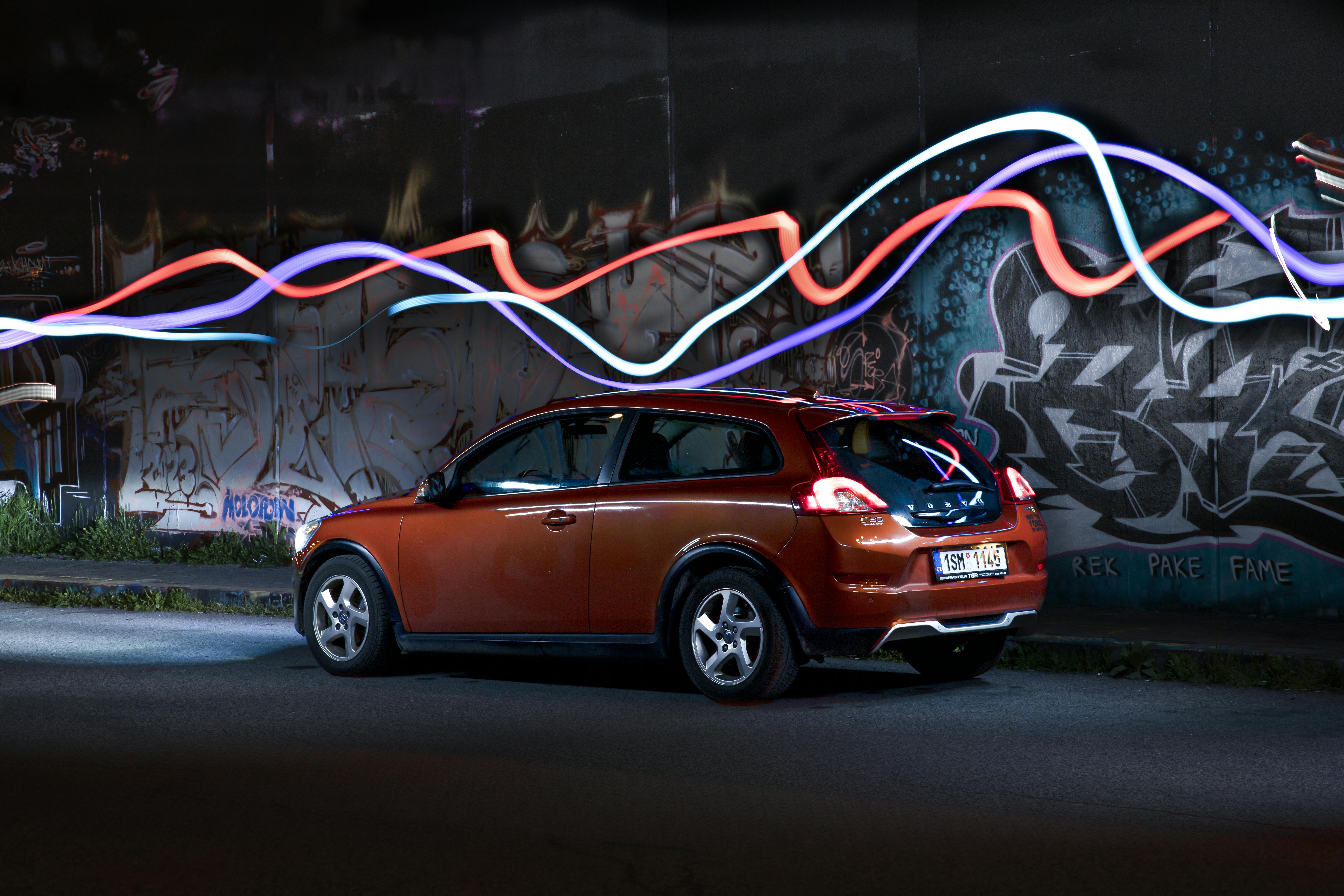 Red Volvo C30 at Night · Free Stock Photo