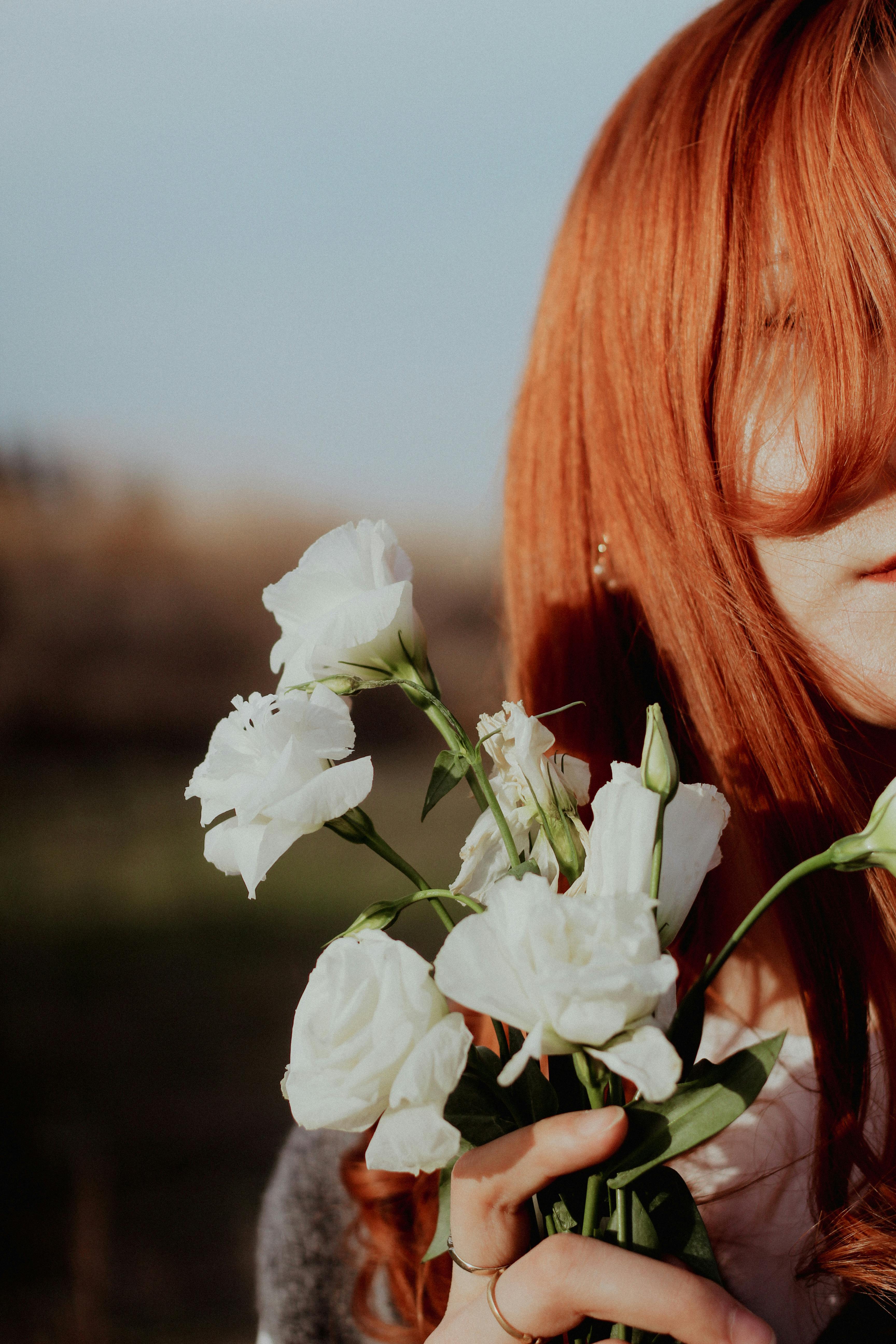 Attractive Woman in Tulle White Dress Holding Rose Behind Back · Free ...