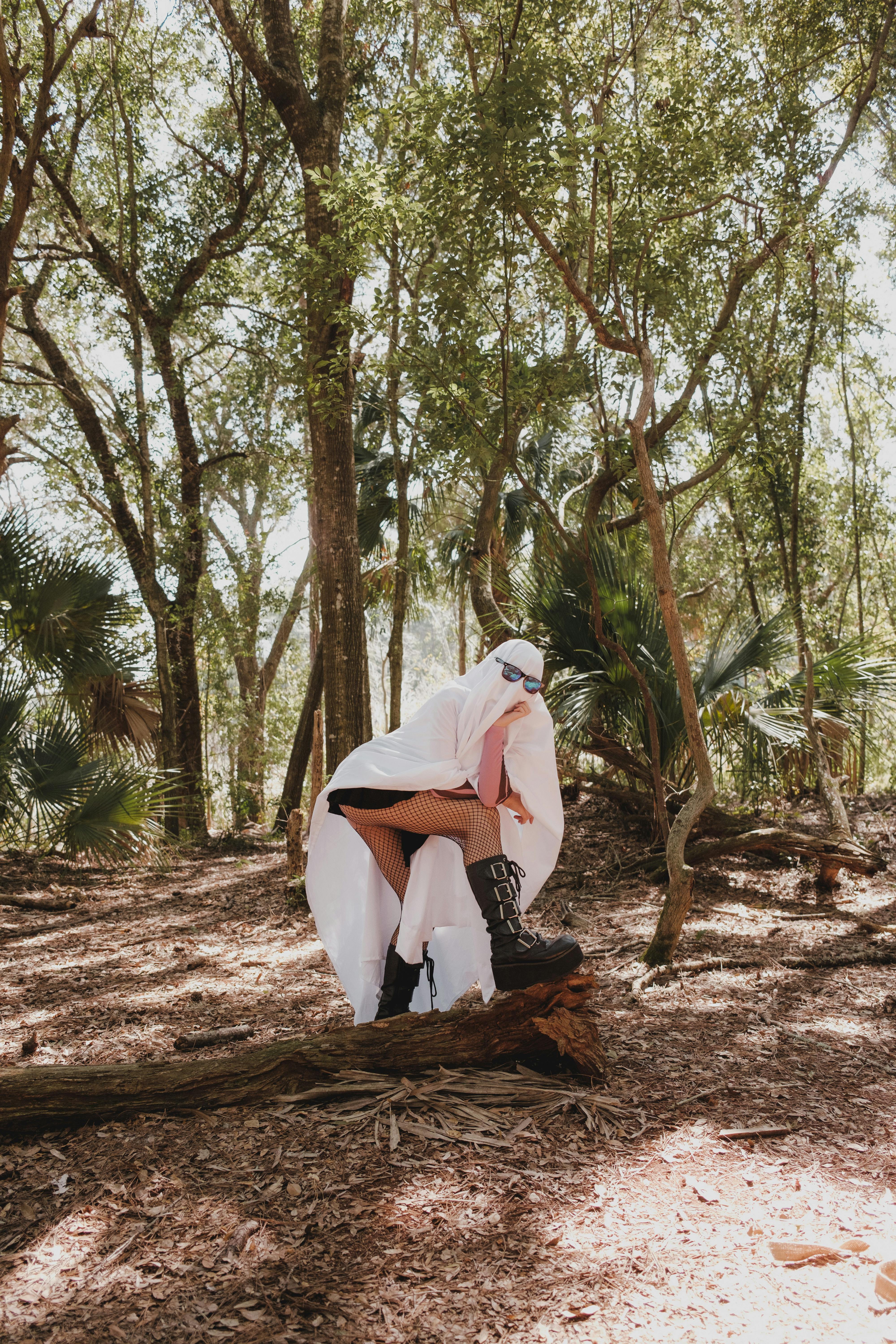 Woman Goofing around in Ghost Costume · Free Stock Photo
