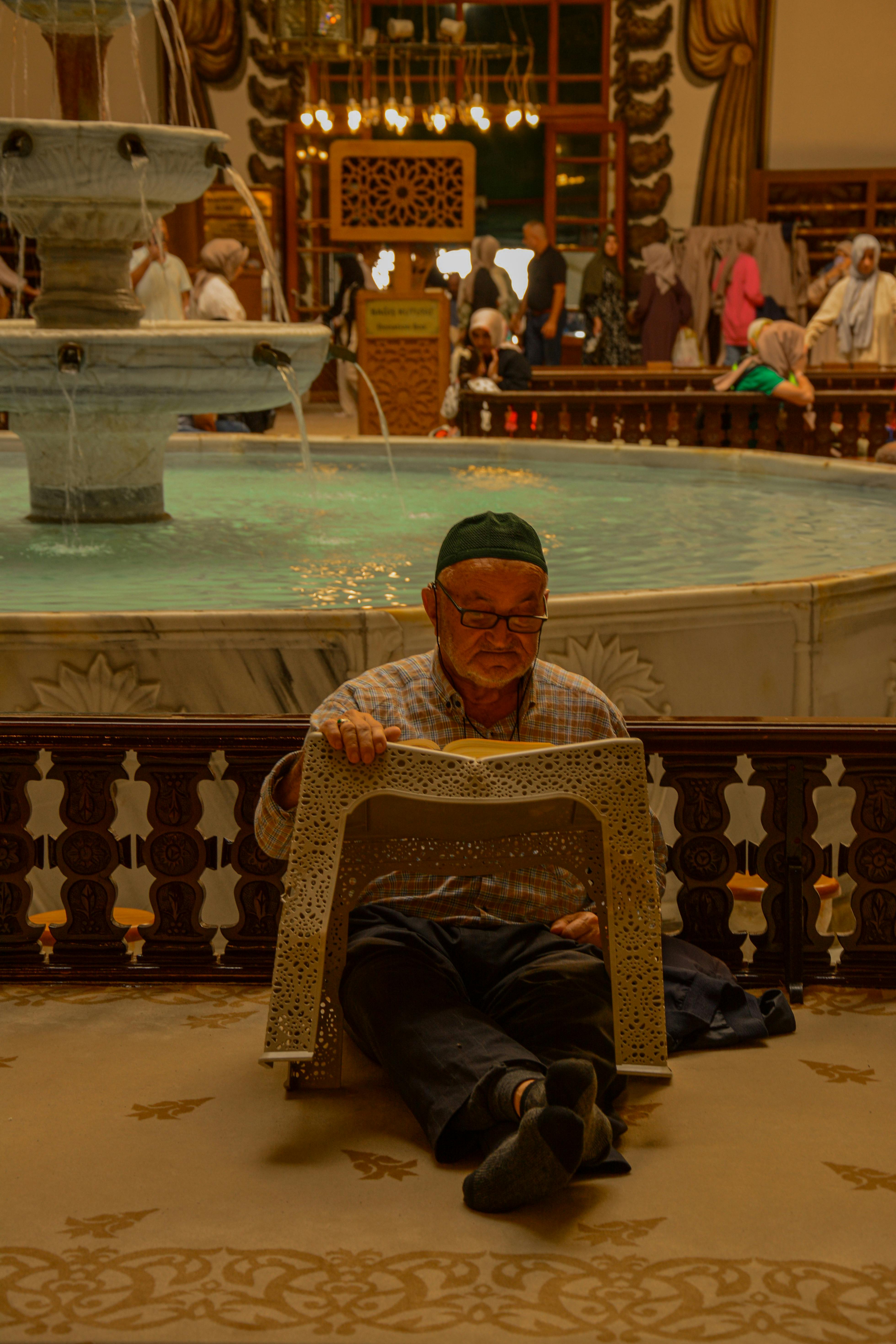 Man Washing His Feet in a Mosque · Free Stock Photo