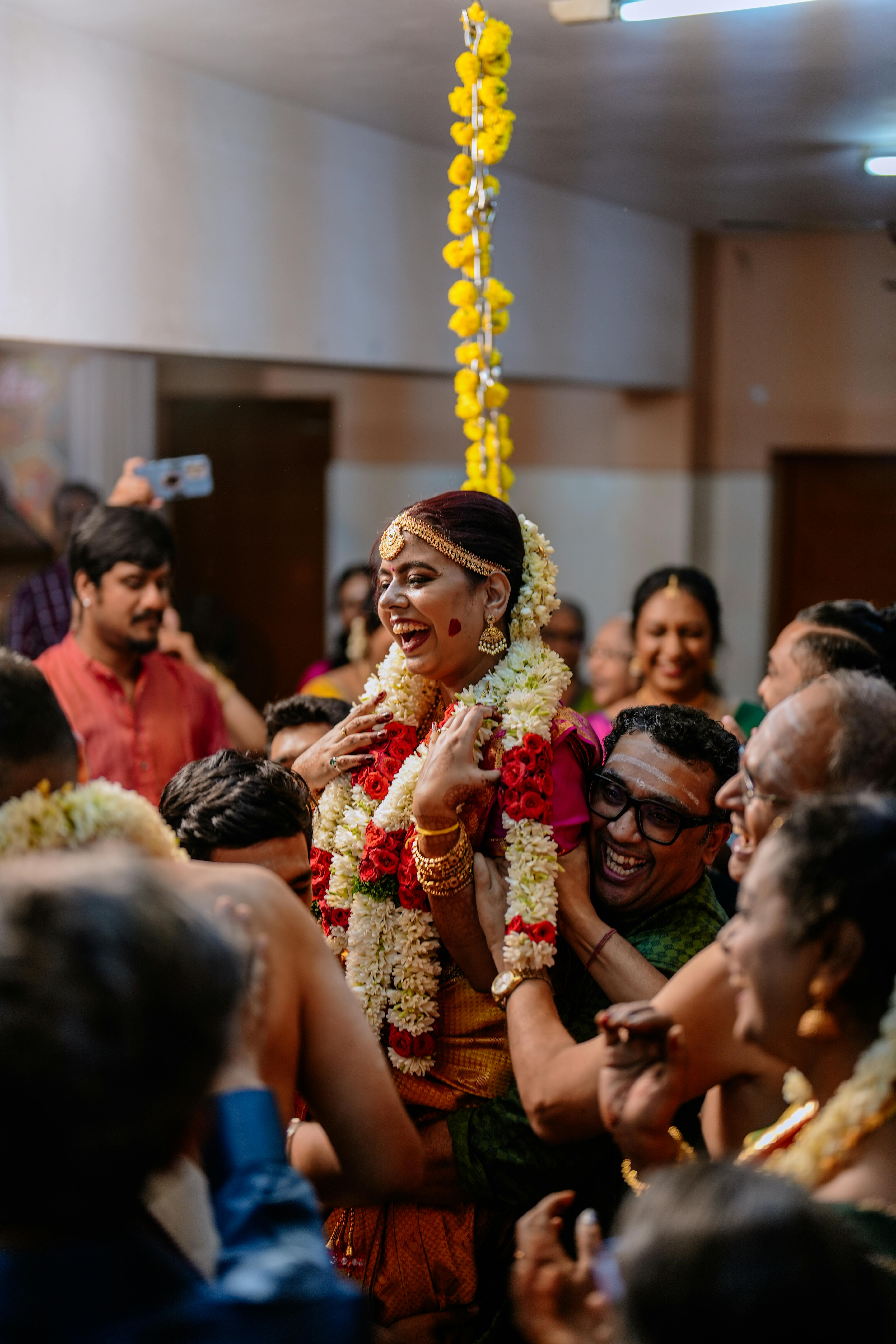 Newlyweds Dancing in a Crowd at Night · Free Stock Photo
