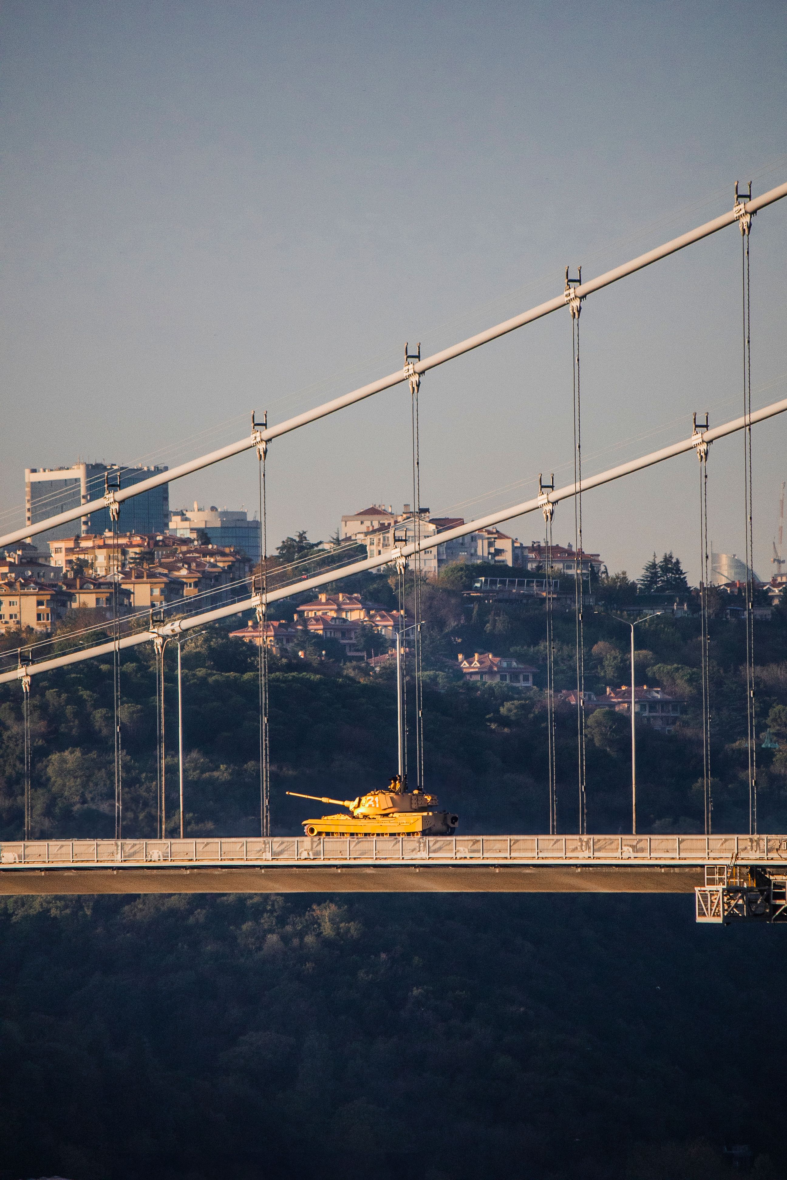 A Tank on a Suspension Bridge · Free Stock Photo