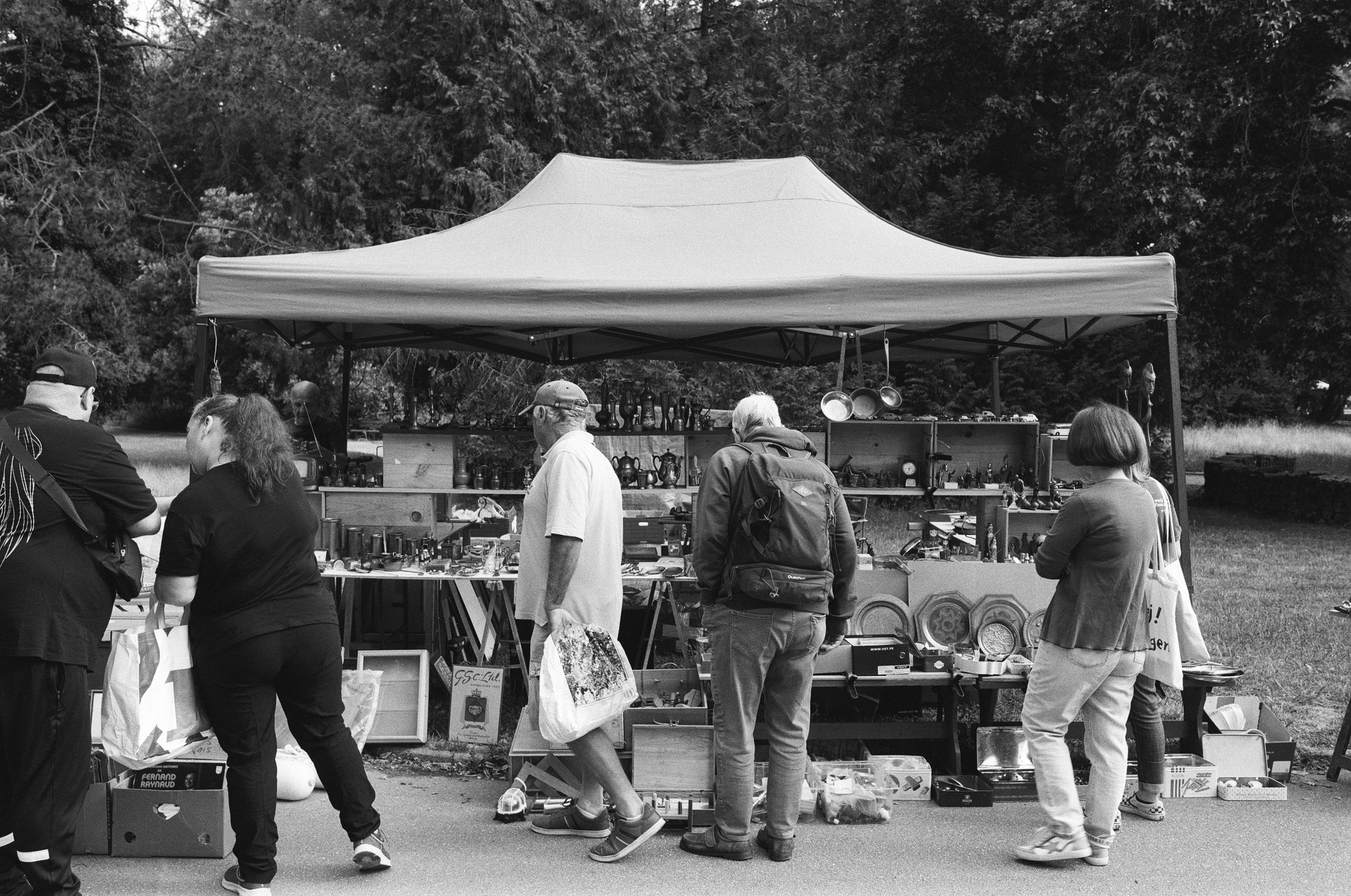 People Looking at Items on Stall on Stree · Free Stock Photo