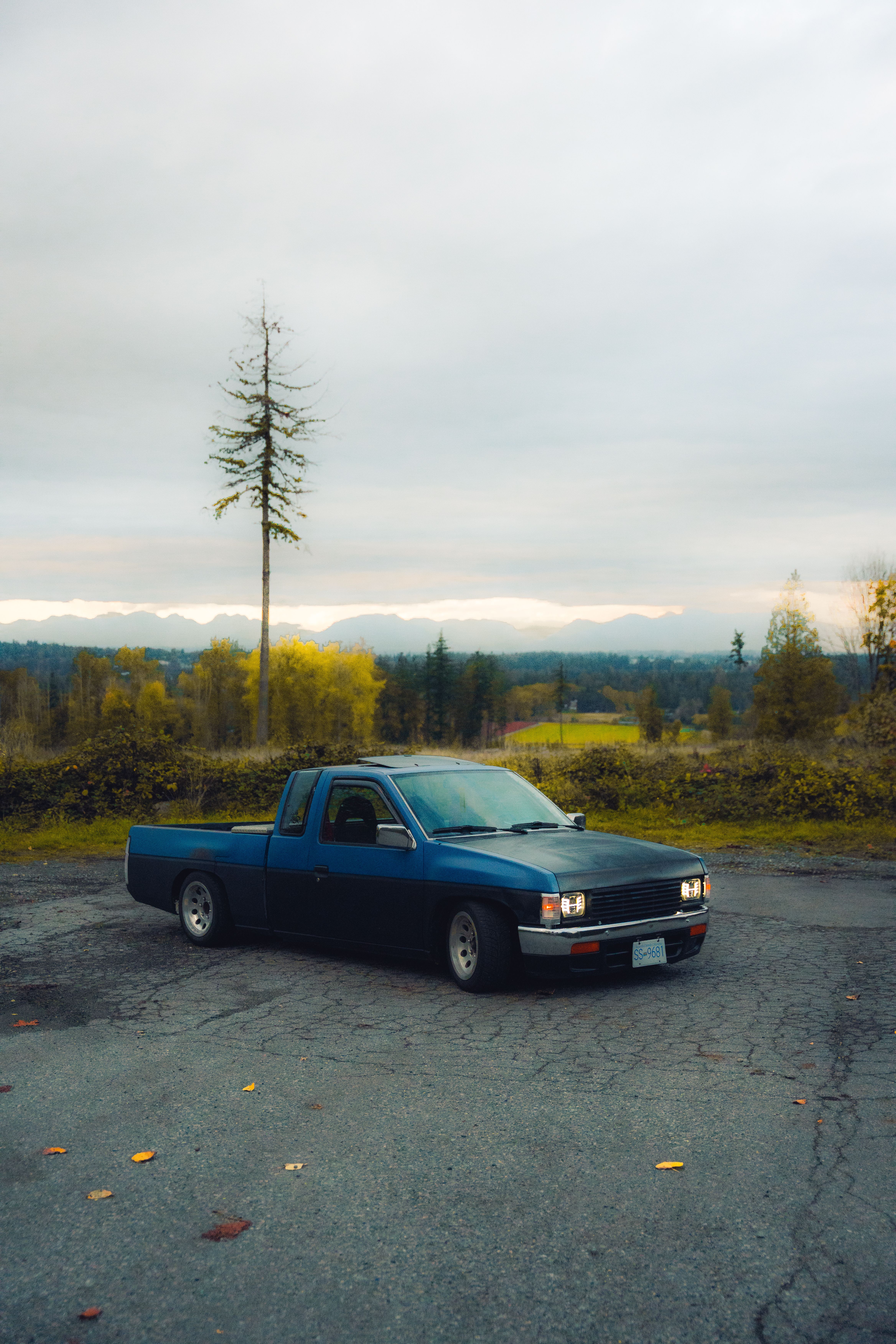 A Nissan Truck Parked Outside · Free Stock Photo