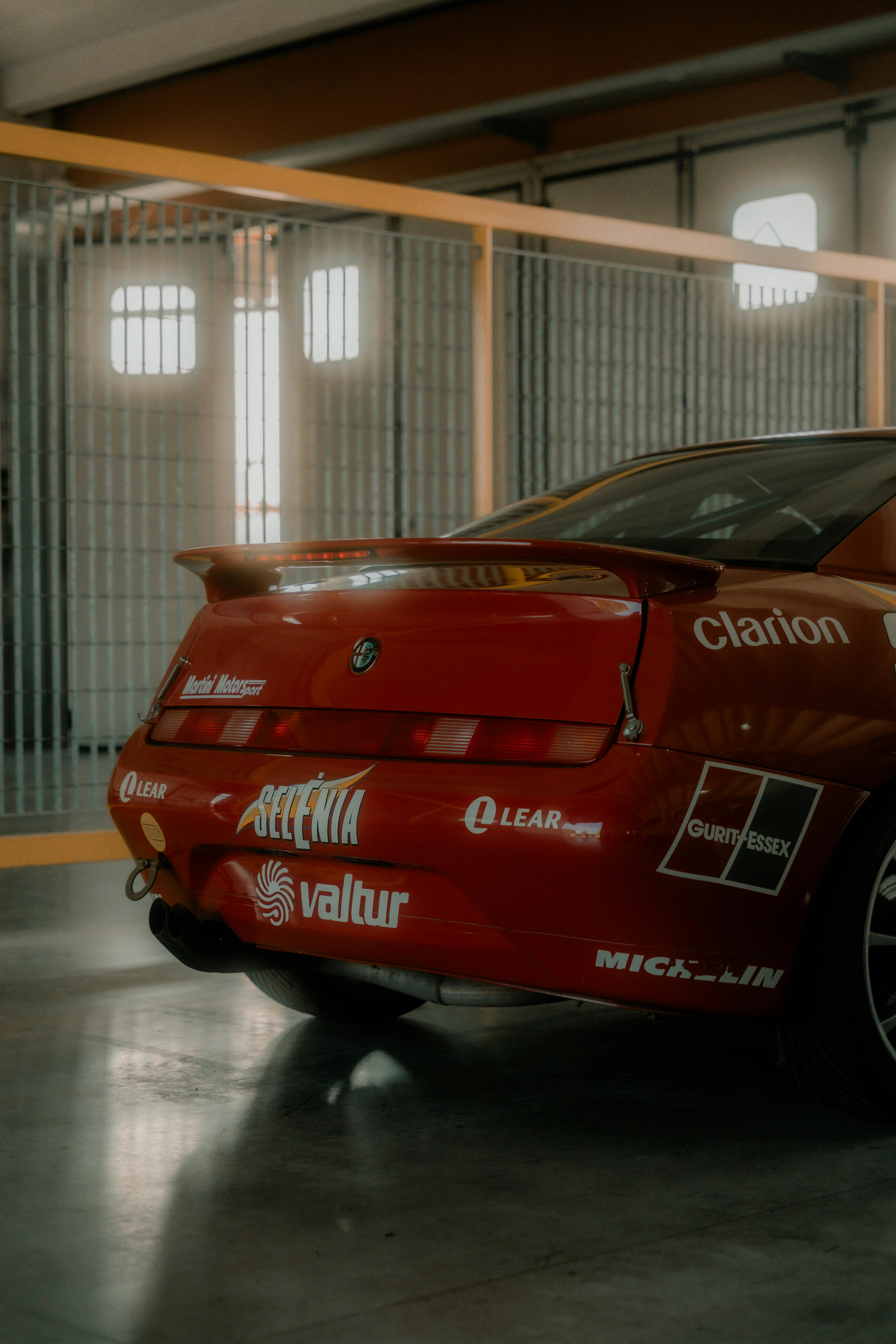 Back of Racing Alfa Romeo GTV · Free Stock Photo