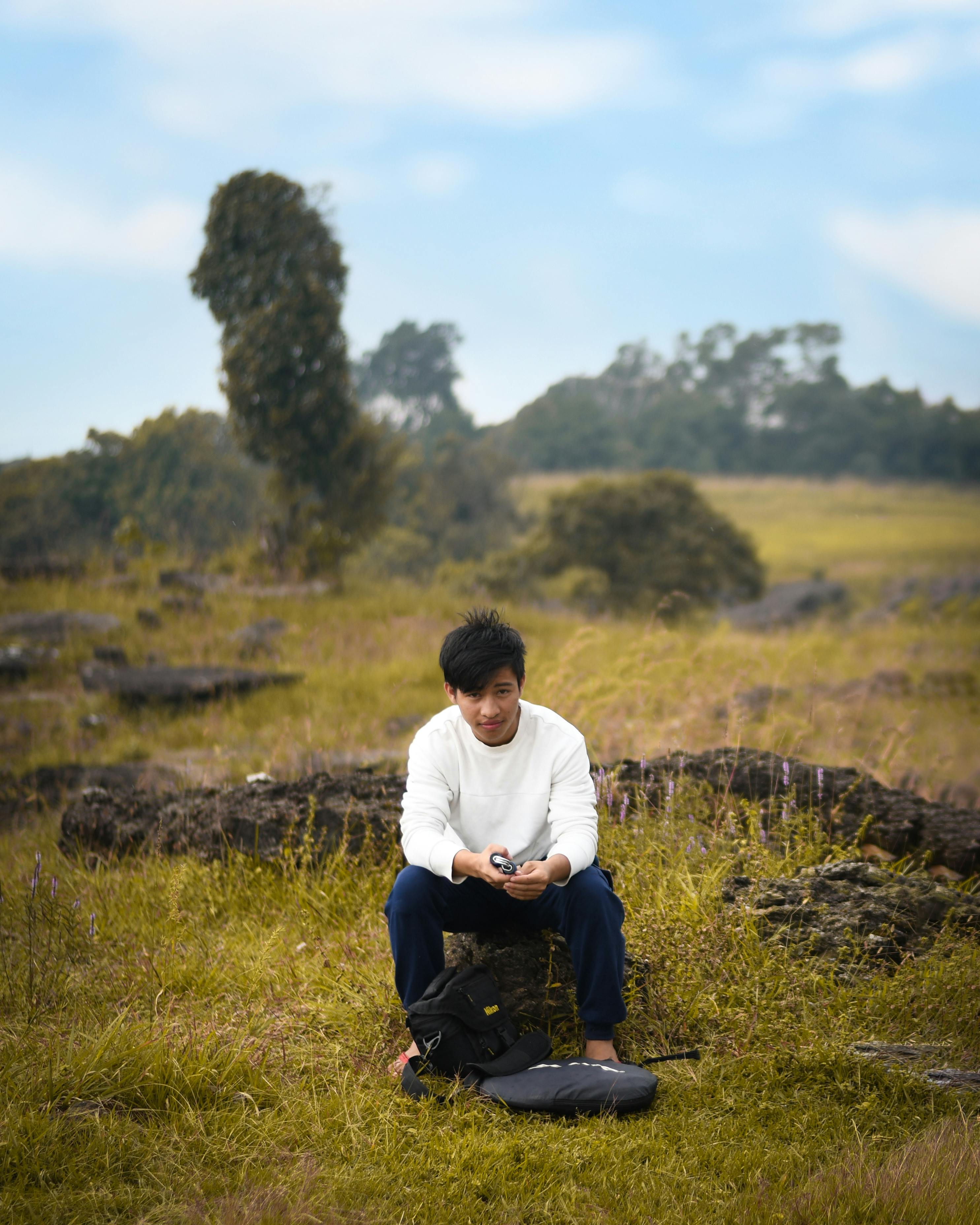 Teenager in White Sweater in Countryside · Free Stock Photo