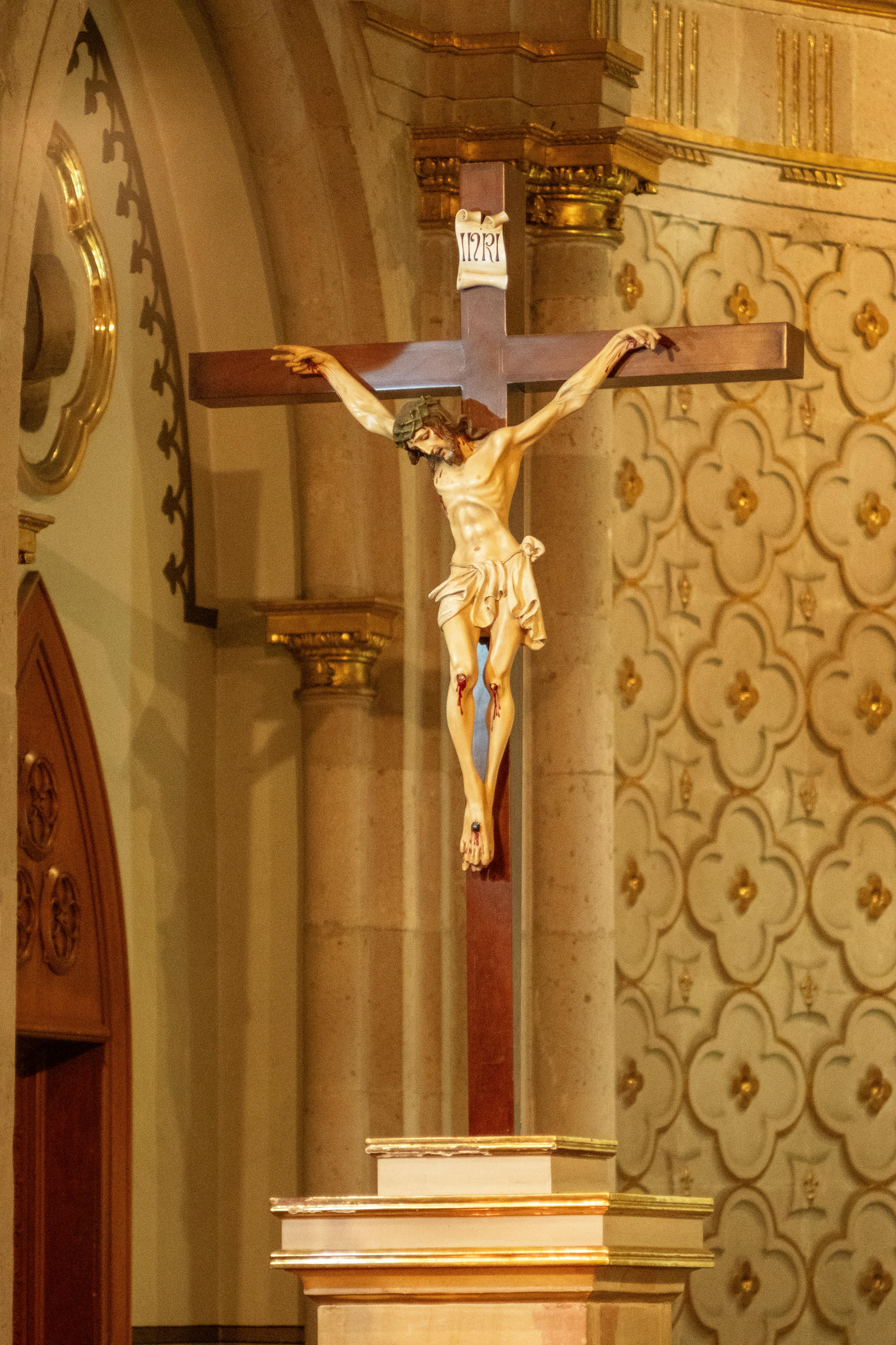 Wooden Cross with a Statue of Jesus in a Church · Free Stock Photo