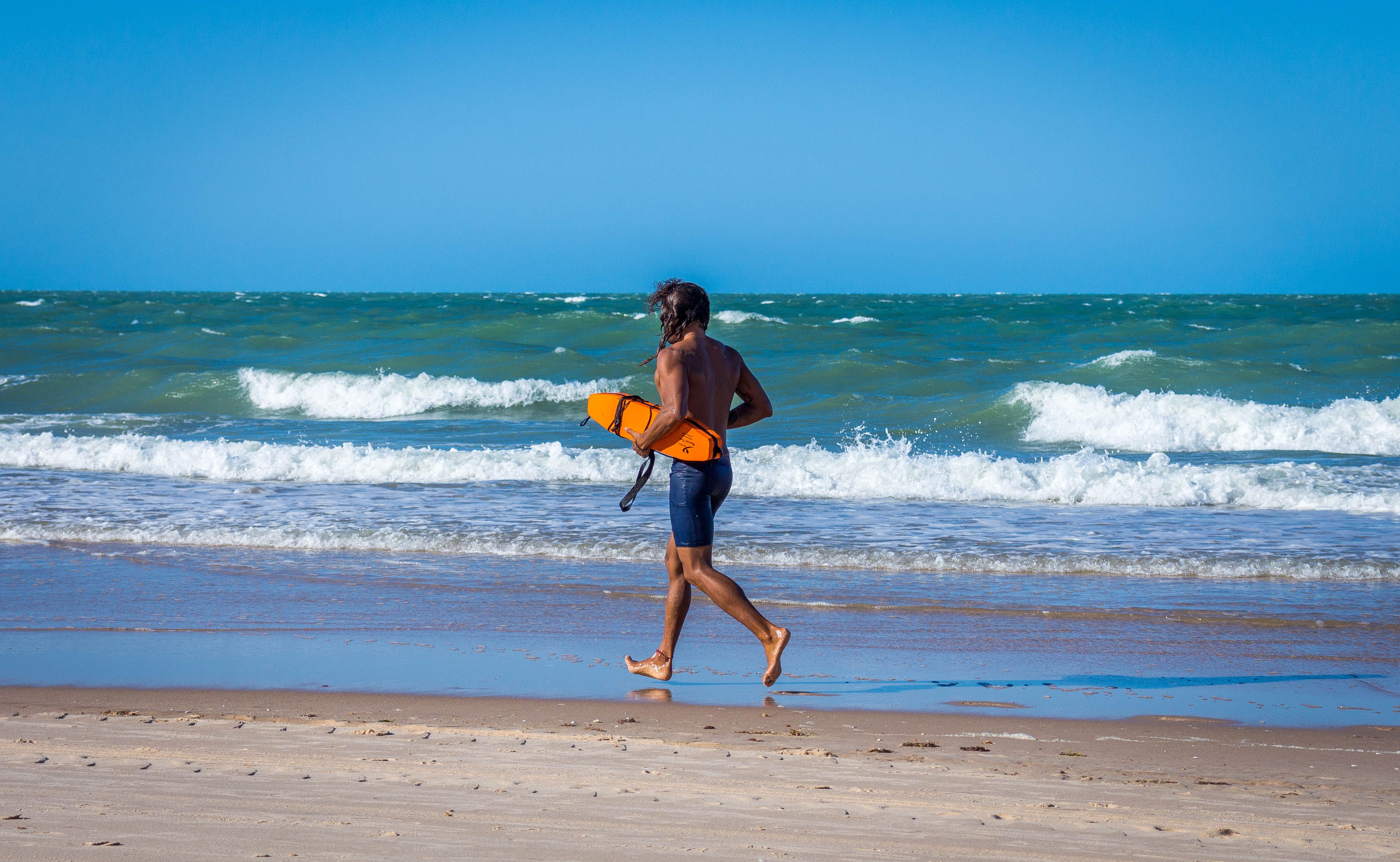 Man Running on Beach · Free Stock Photo