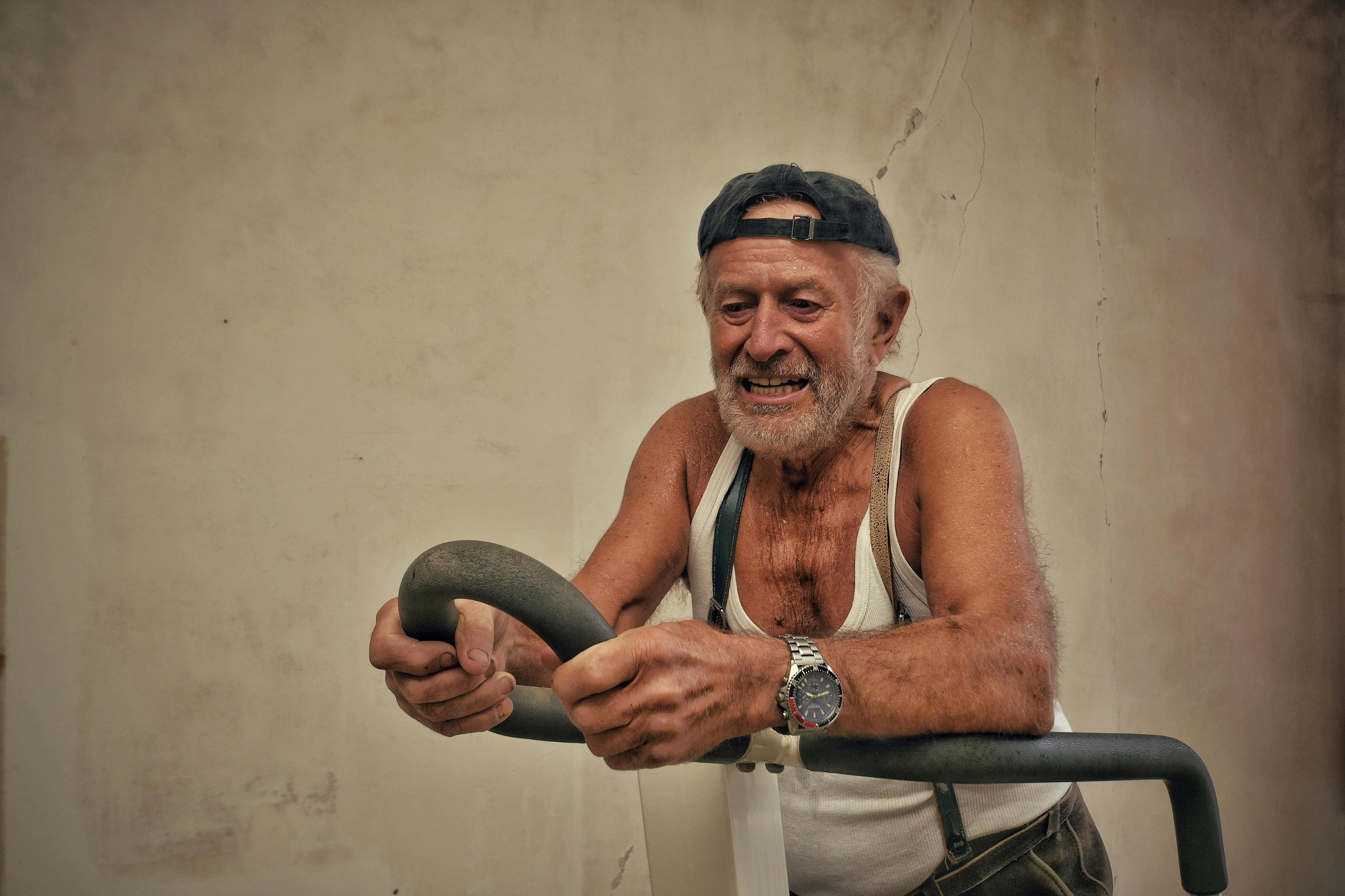 Elderly Man Working at Bazaar · Free Stock Photo