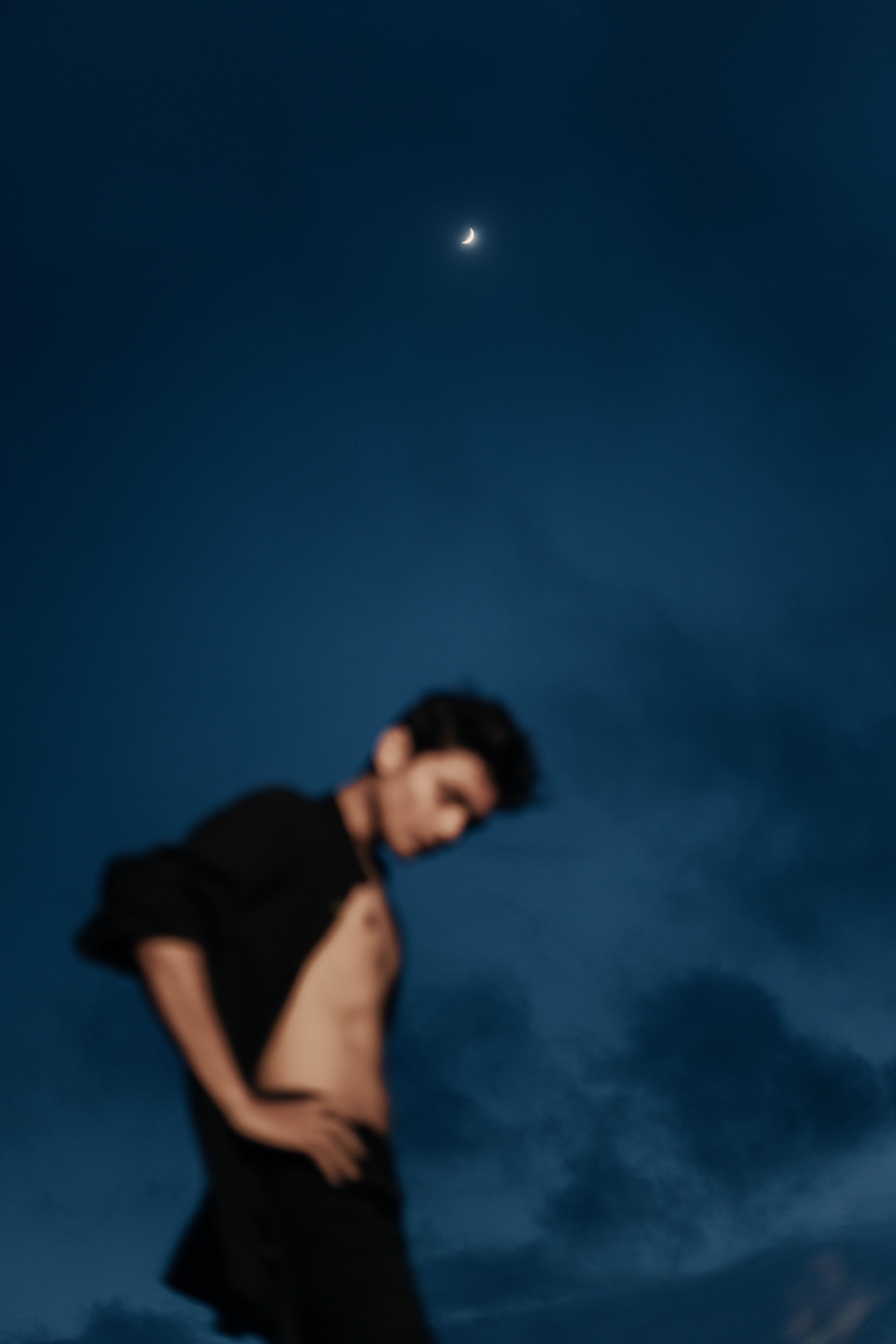 Shirtless Man Standing under Moon on Night Sky · Free Stock Photo