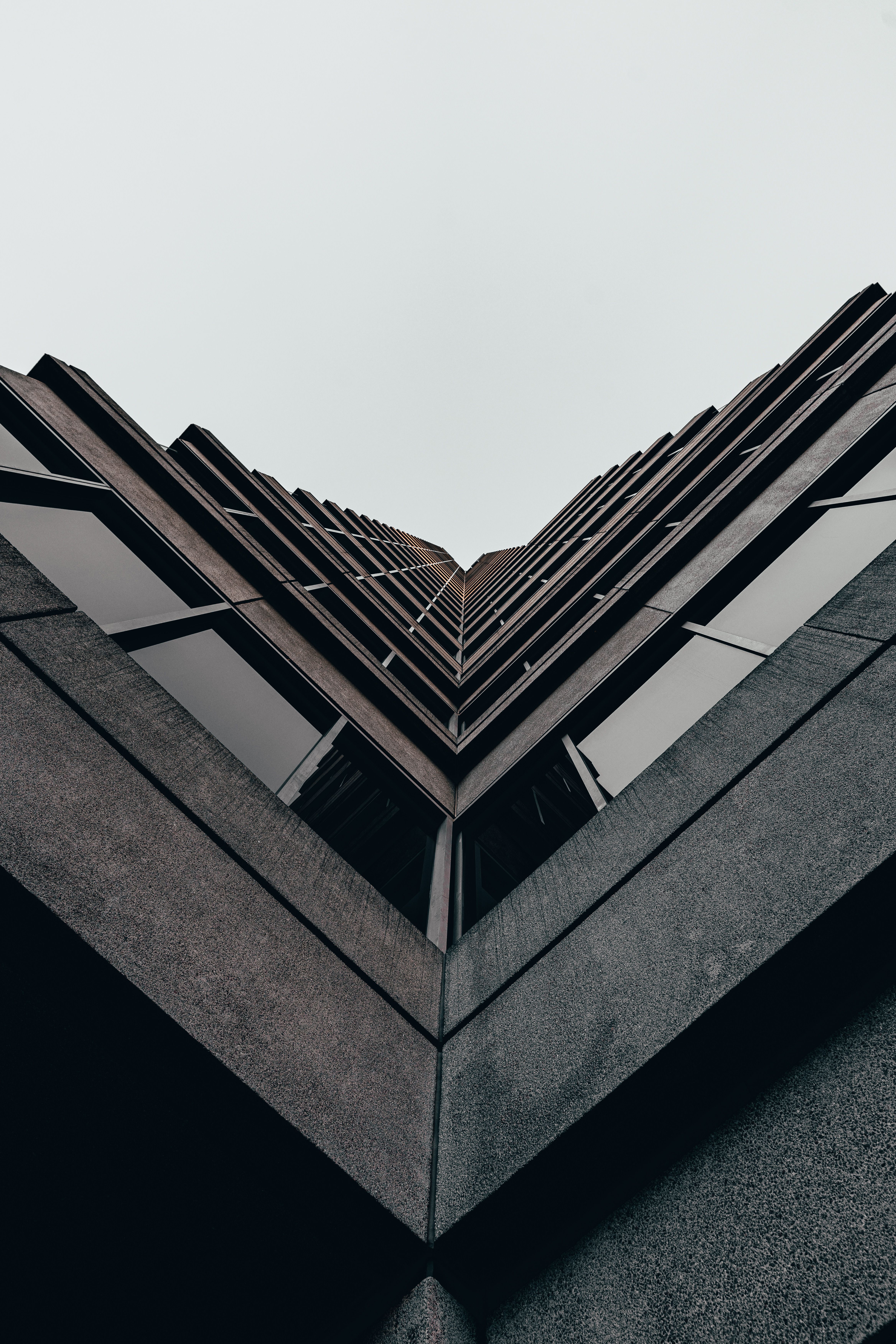 Modern High-Rise Building Facade Seen from below · Free Stock Photo