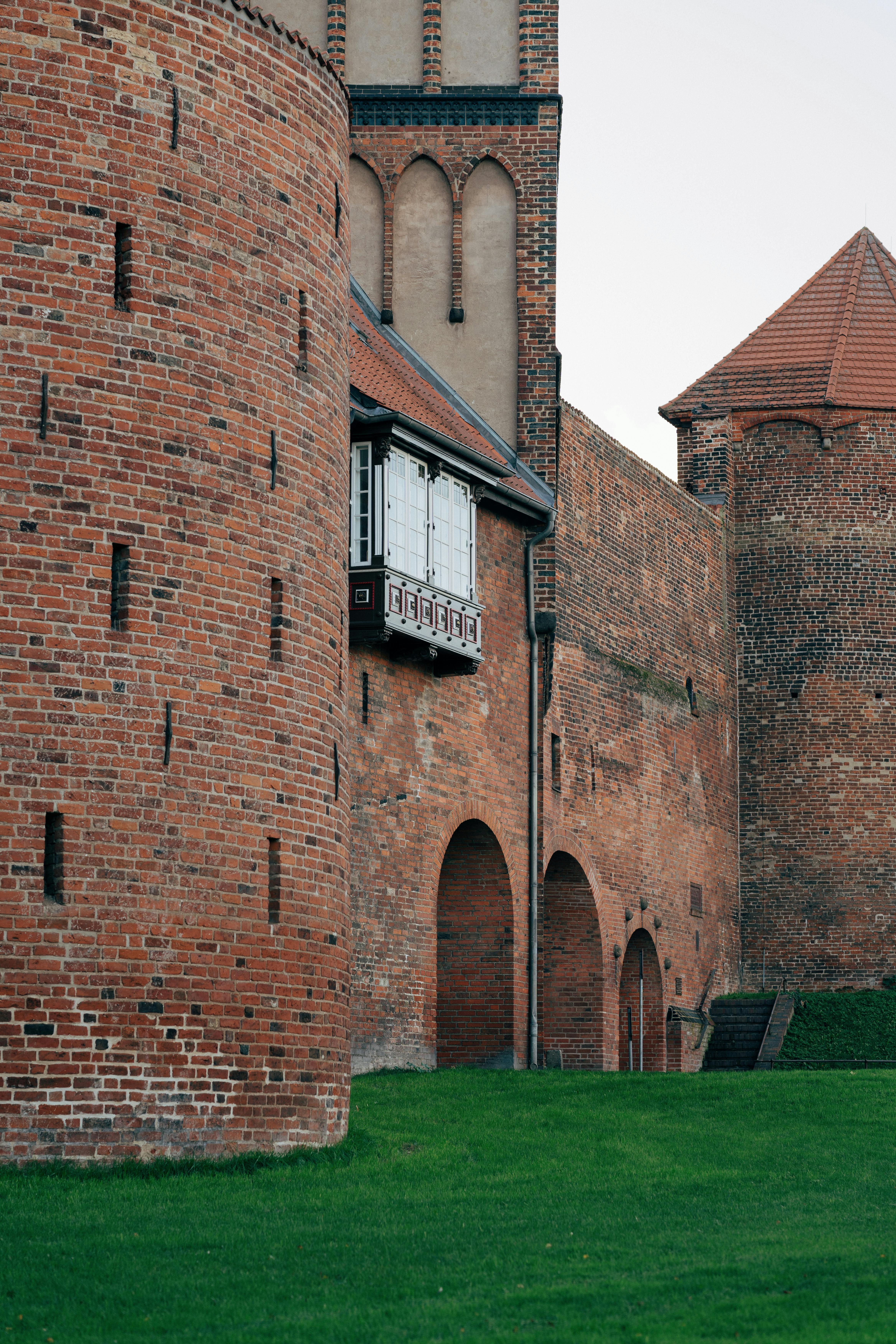 Stone Castle With Green Grass Front Yard · Free Stock Photo