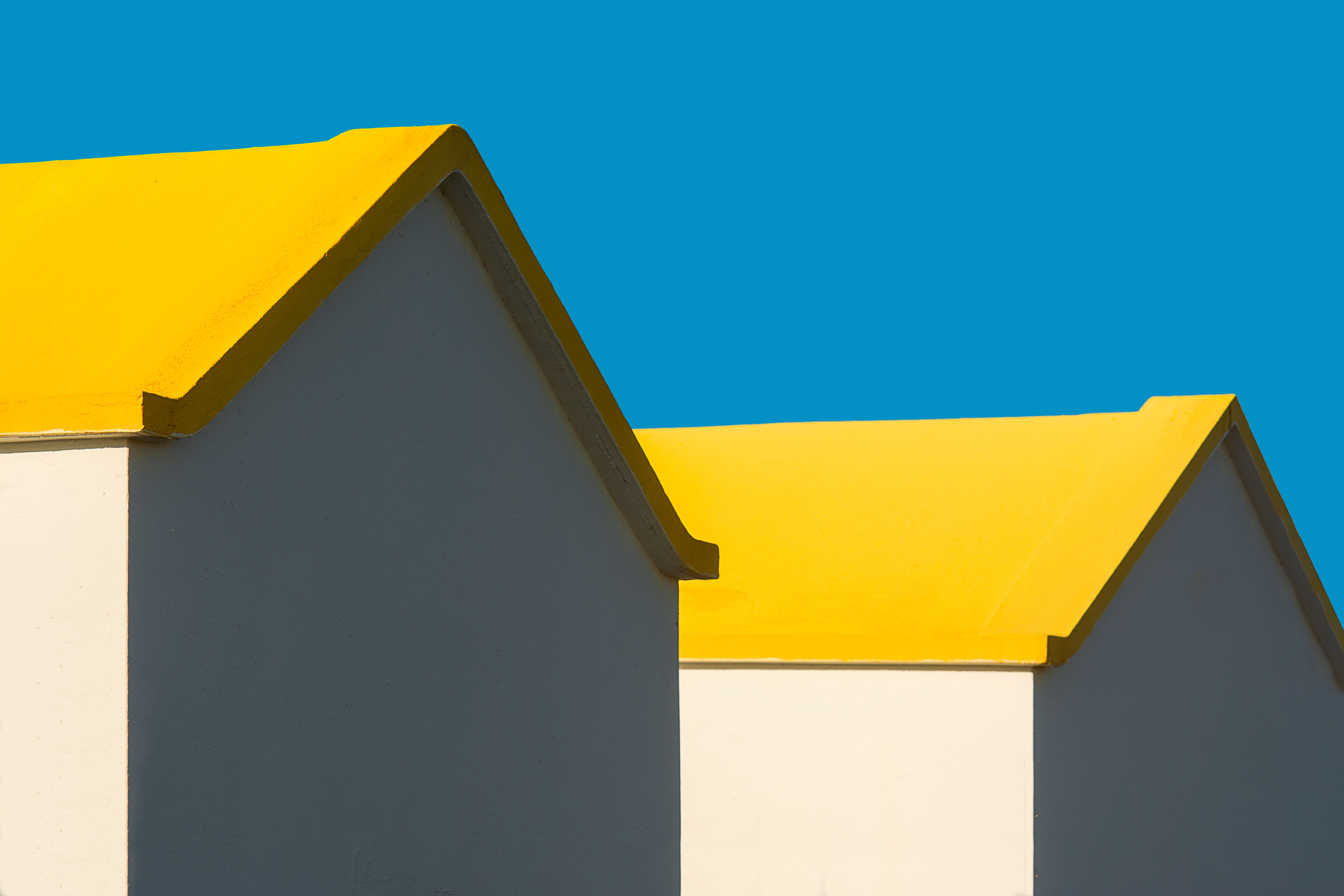 Roof on a Yellow Building · Free Stock Photo