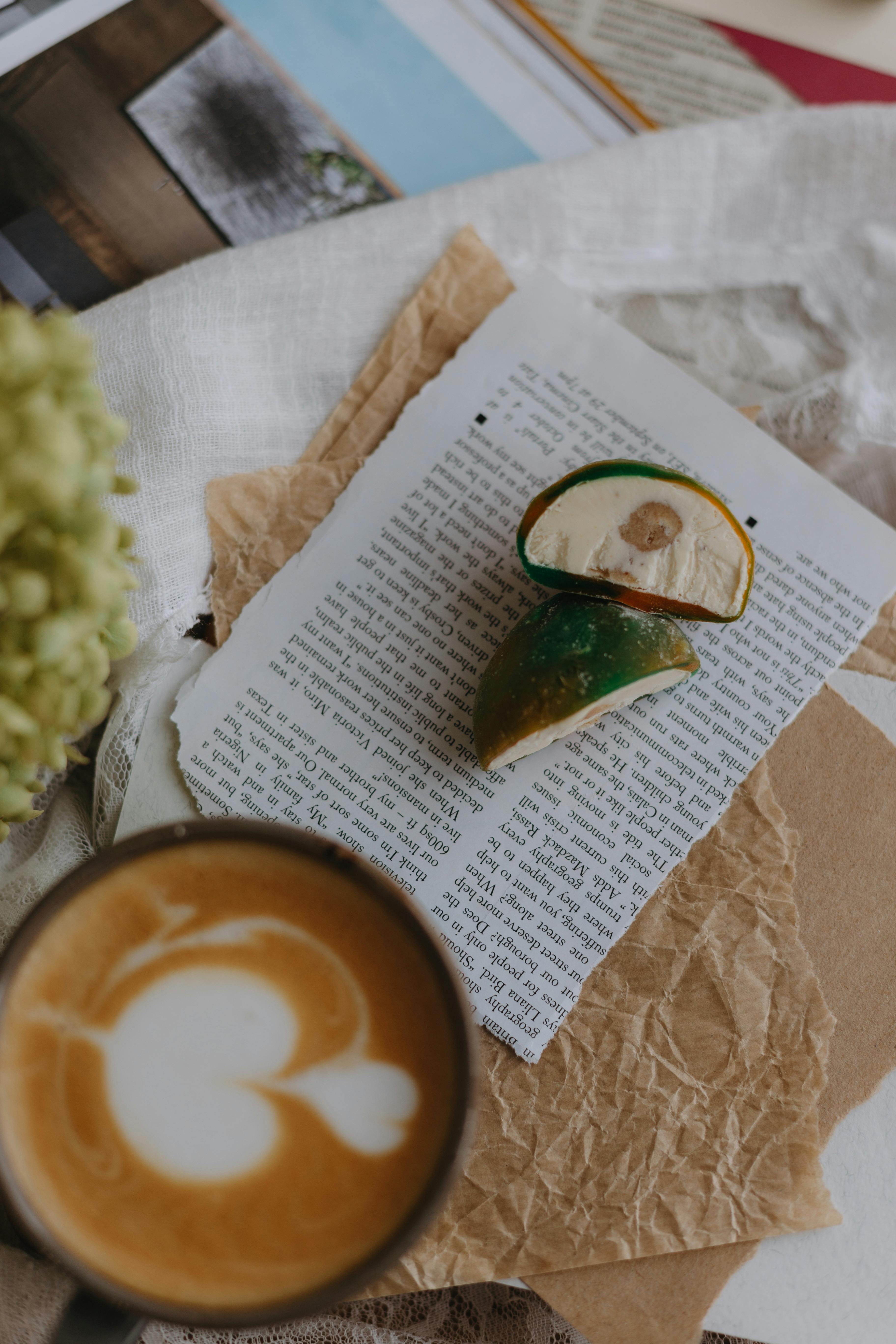 Mochi and Coffee on Papers · Free Stock Photo