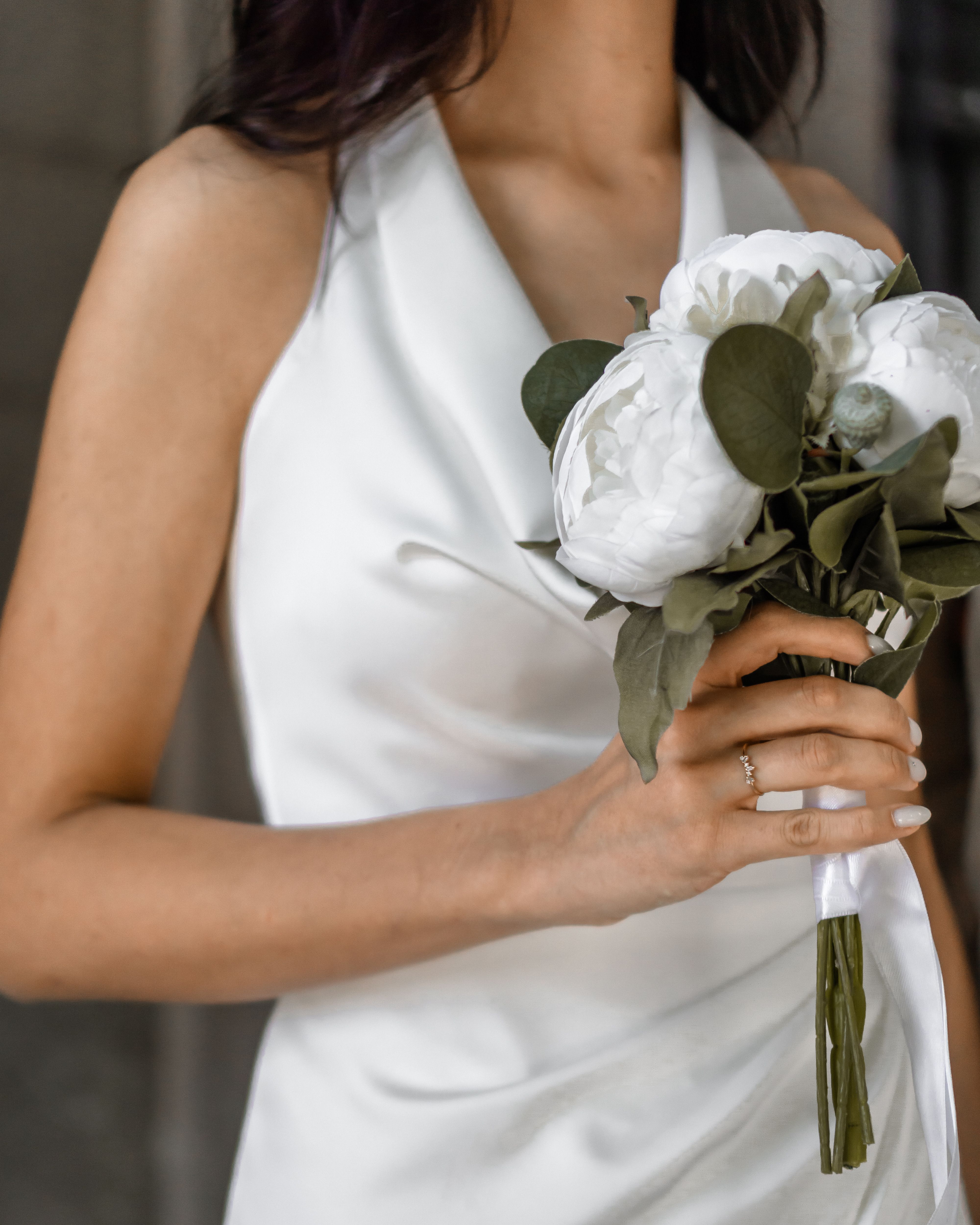 Bride Holding a Flower Bouquet · Free Stock Photo