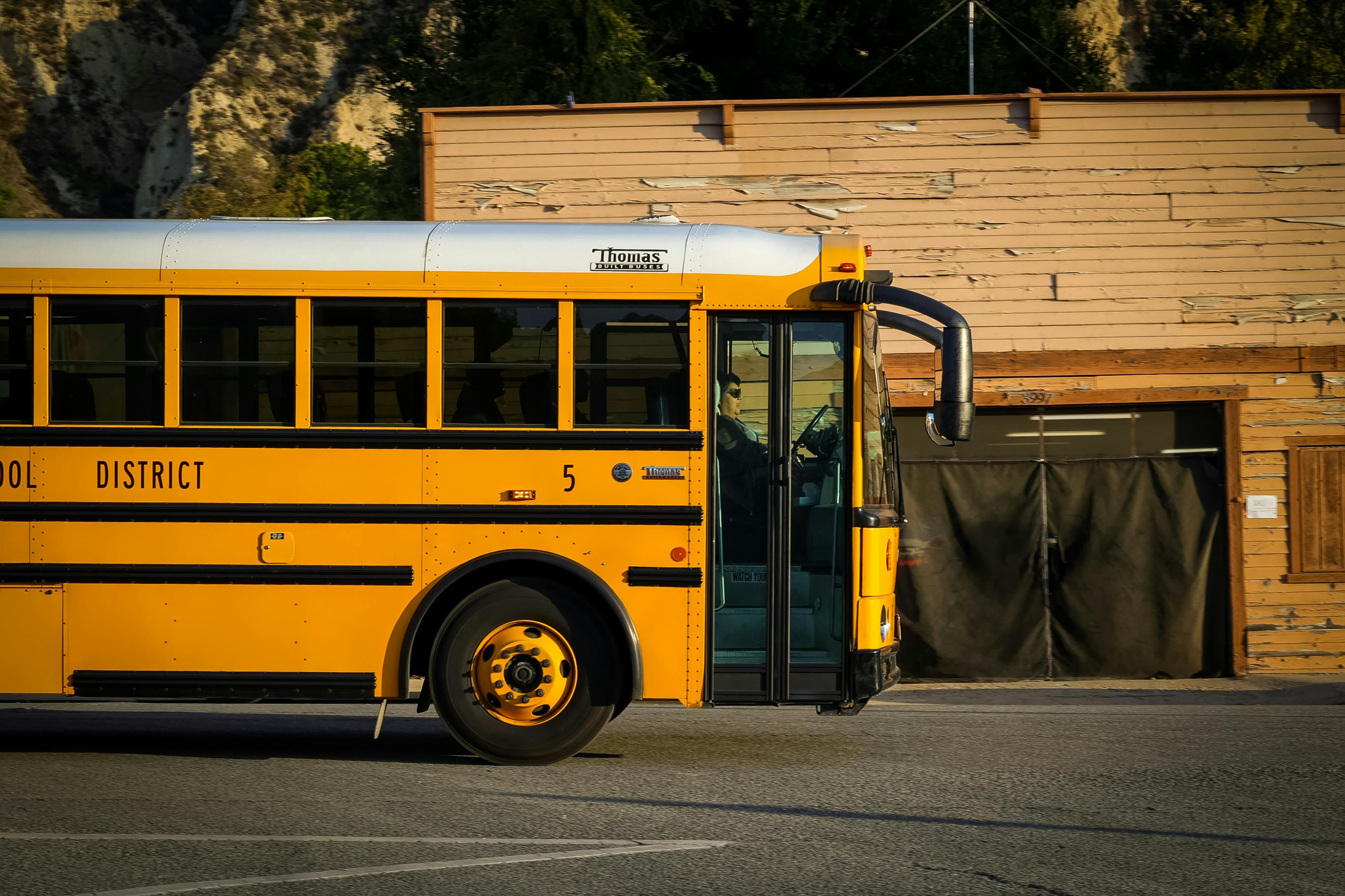 Yellow School Bus on the Street · Free Stock Photo
