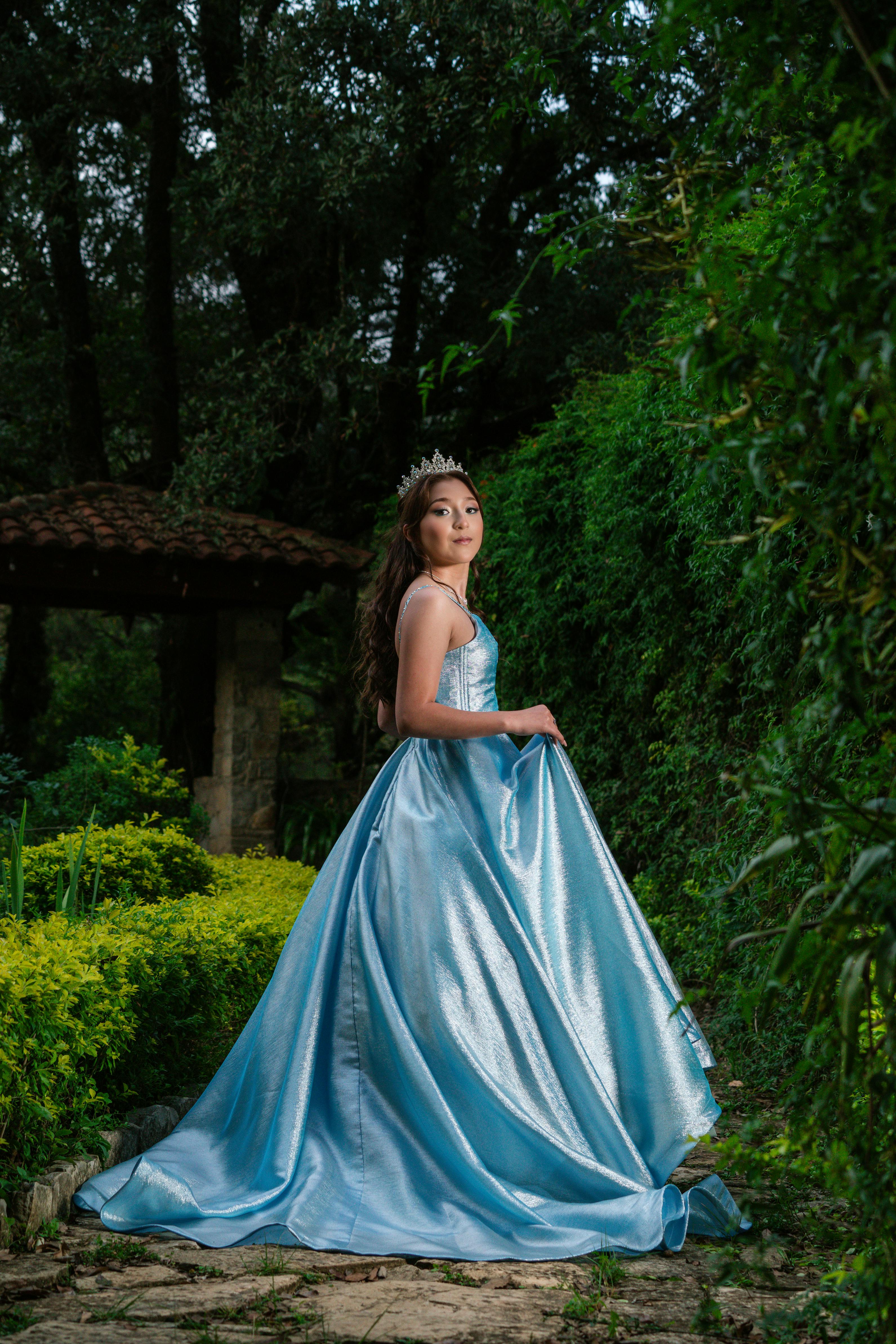 Woman in Princess Gown Walking Through Garden · Free Stock Photo