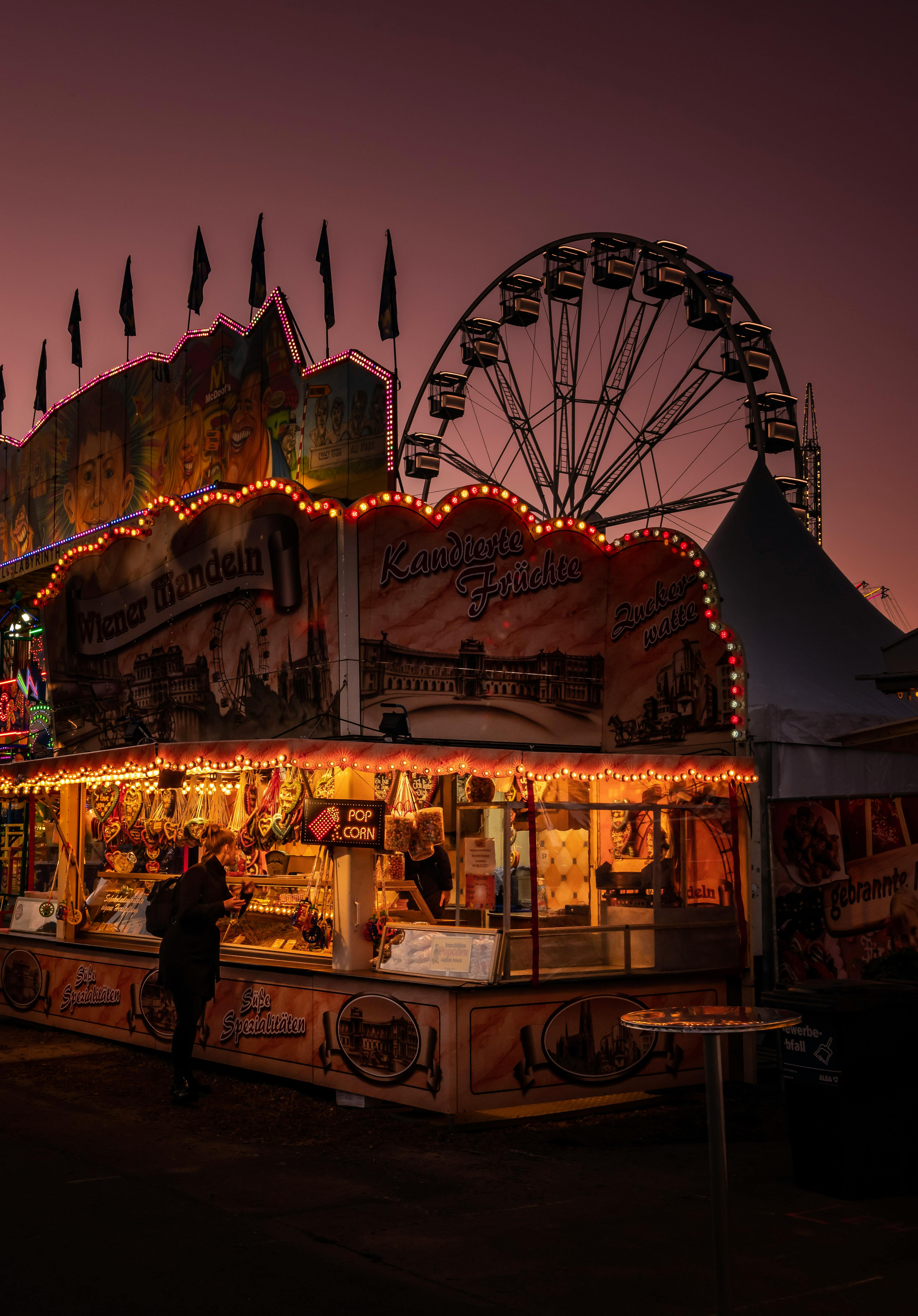Food Stand in Amusement Park at Dusk · Free Stock Photo