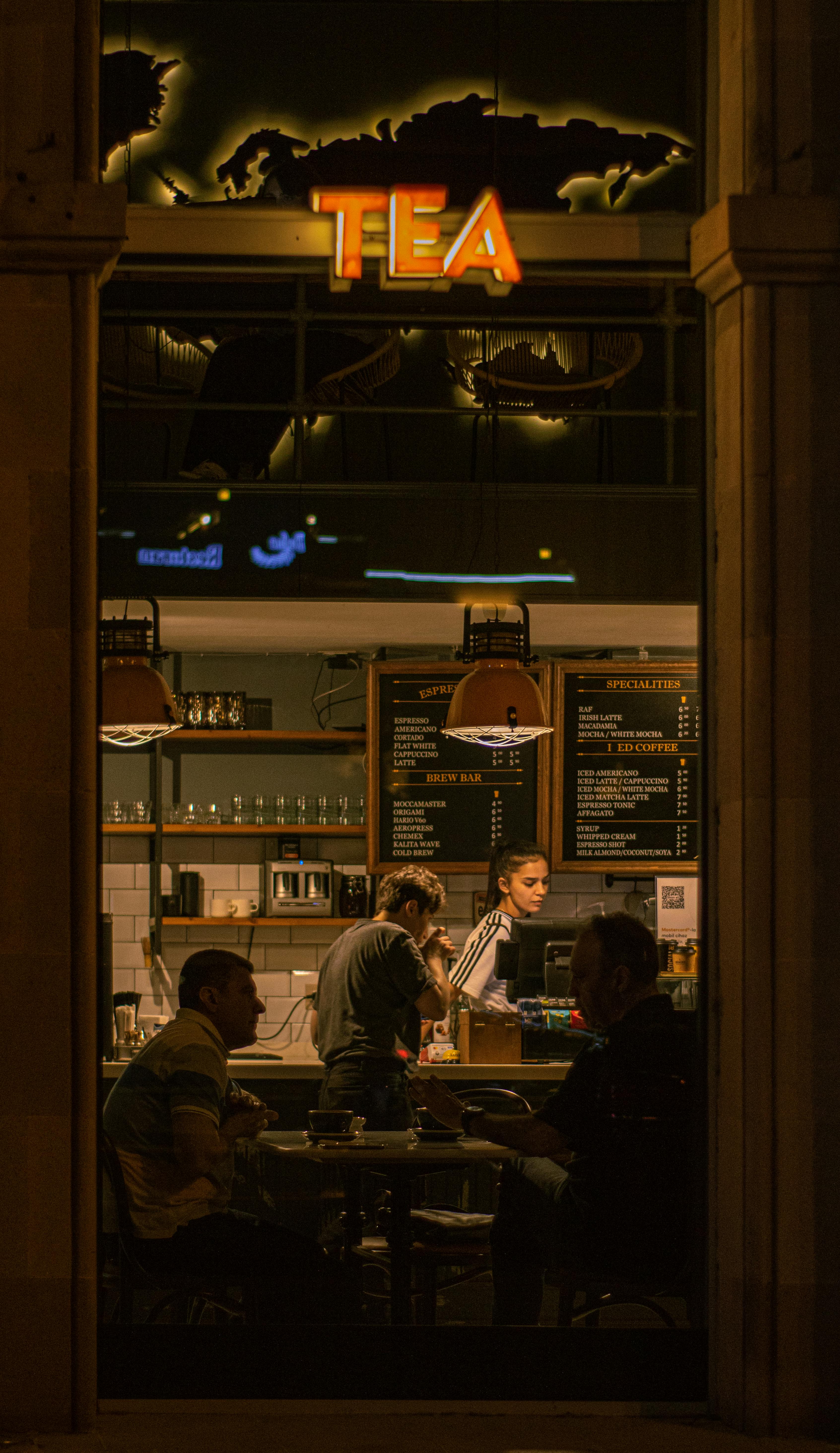 People behind Cafe Window · Free Stock Photo
