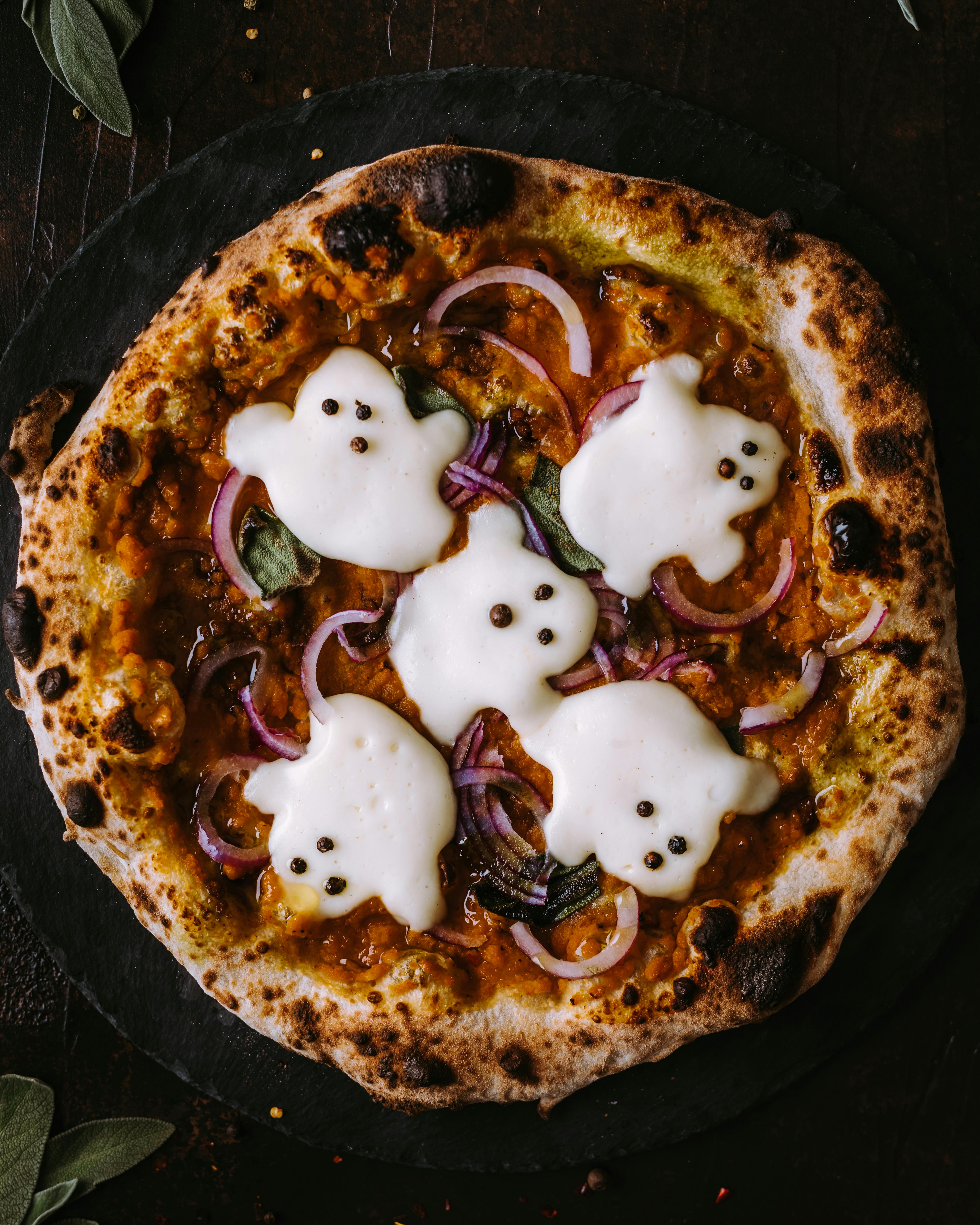 Pizza with Mozzarella Shaped as Ghosts for Halloween · Free Stock Photo