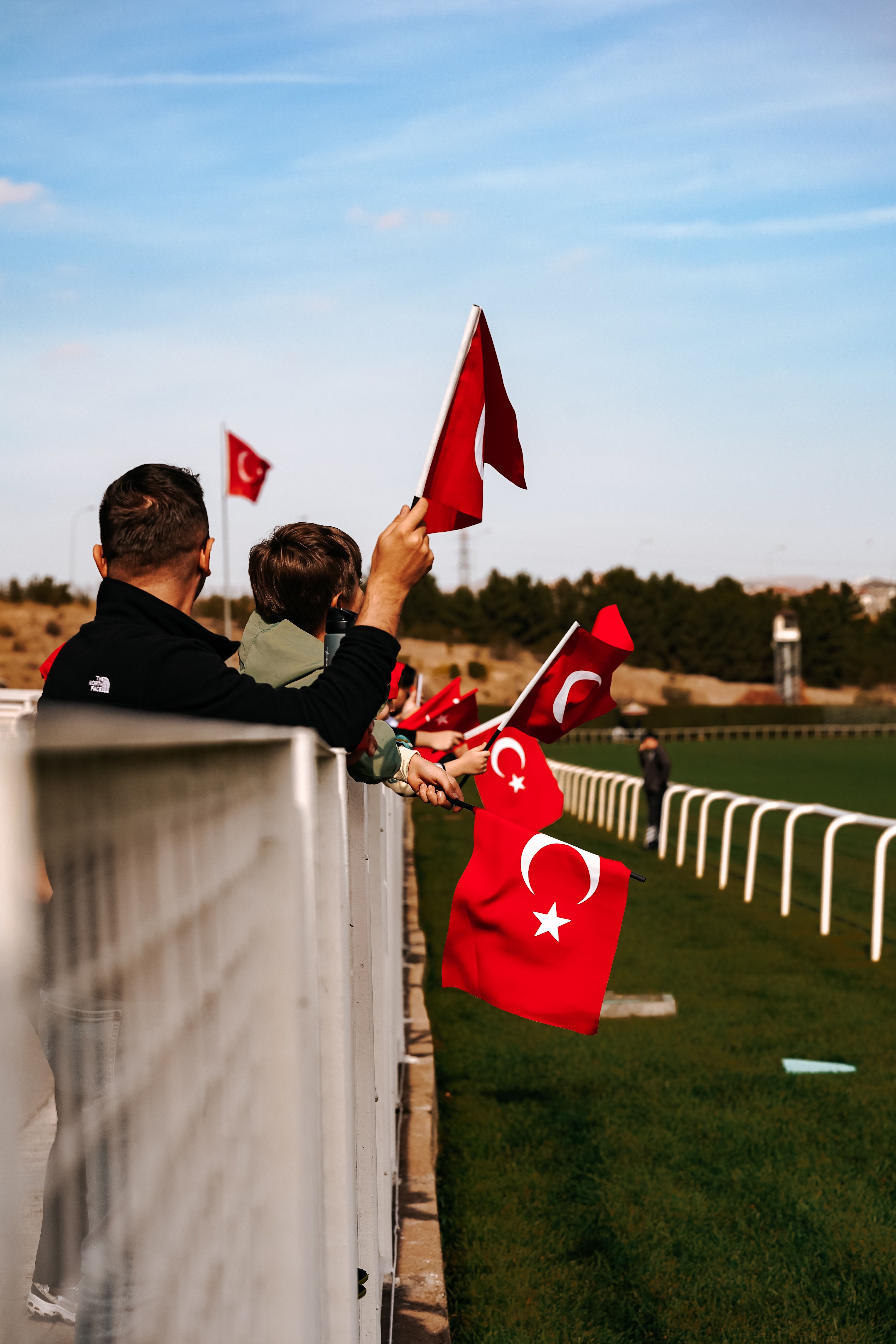 People with Turkish Flags on a Stadium · Free Stock Photo