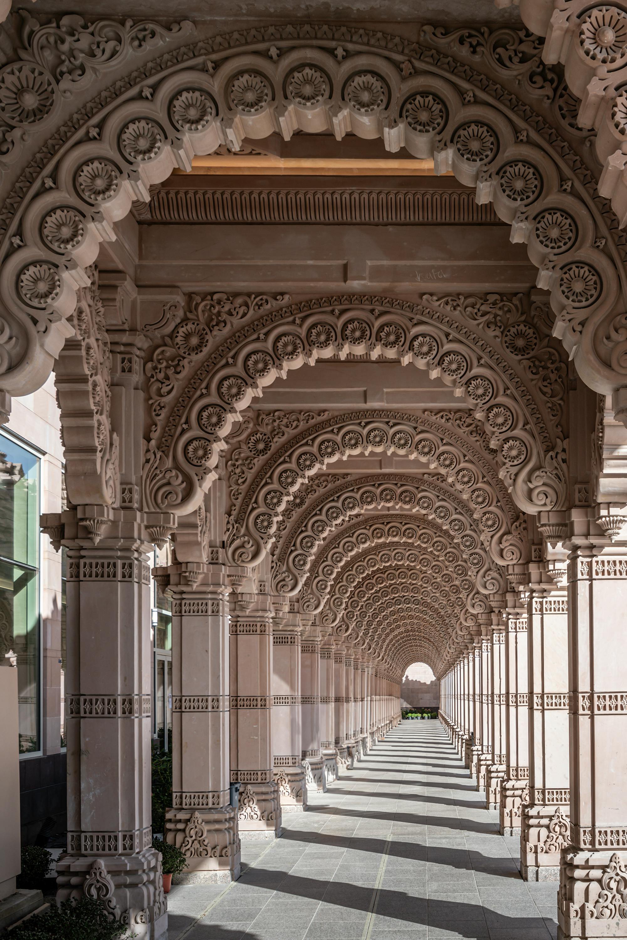 Colonnade of Vintage, Ornamented Columns · Free Stock Photo