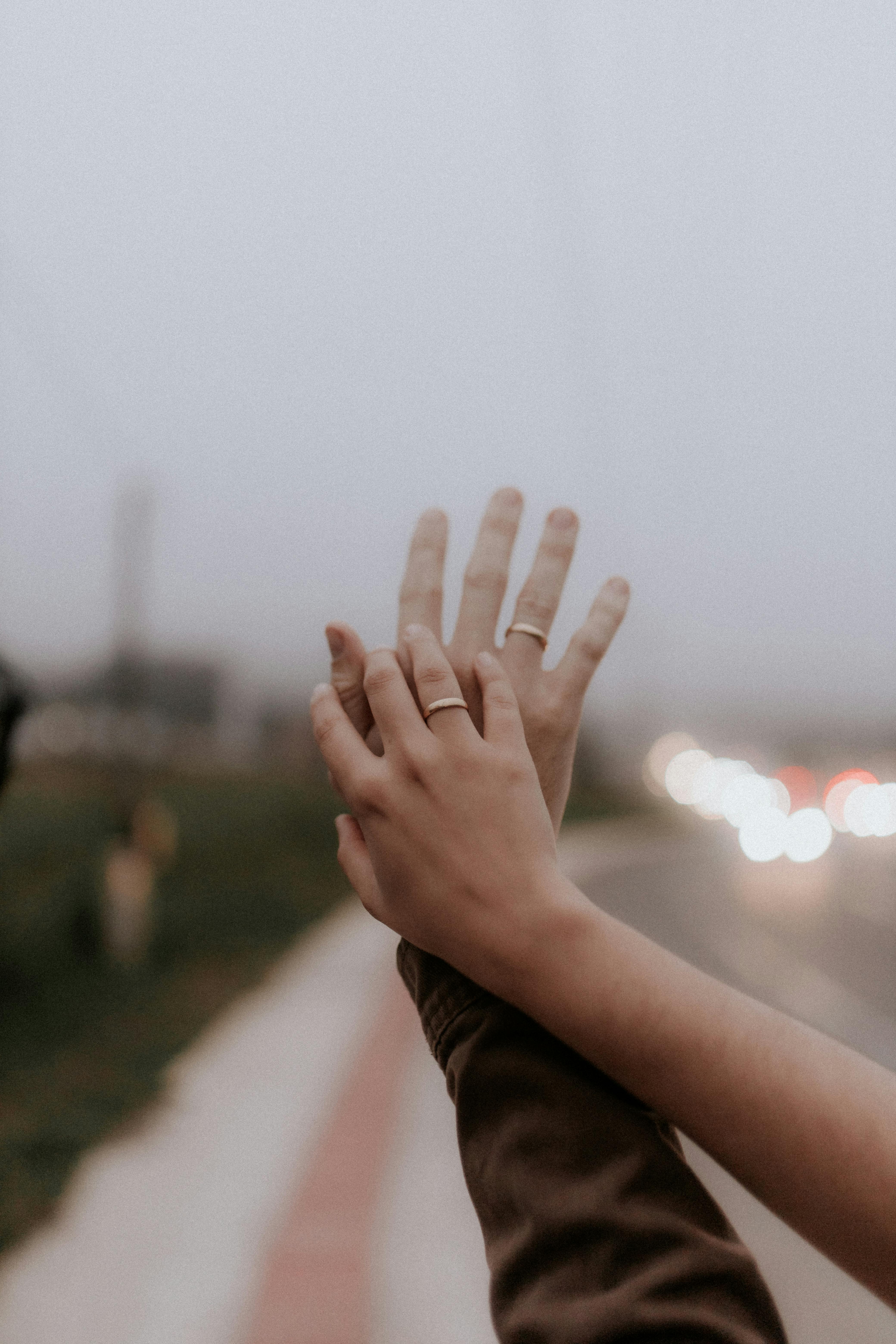 Close up of Couple Hands with Rings Together · Free Stock Photo