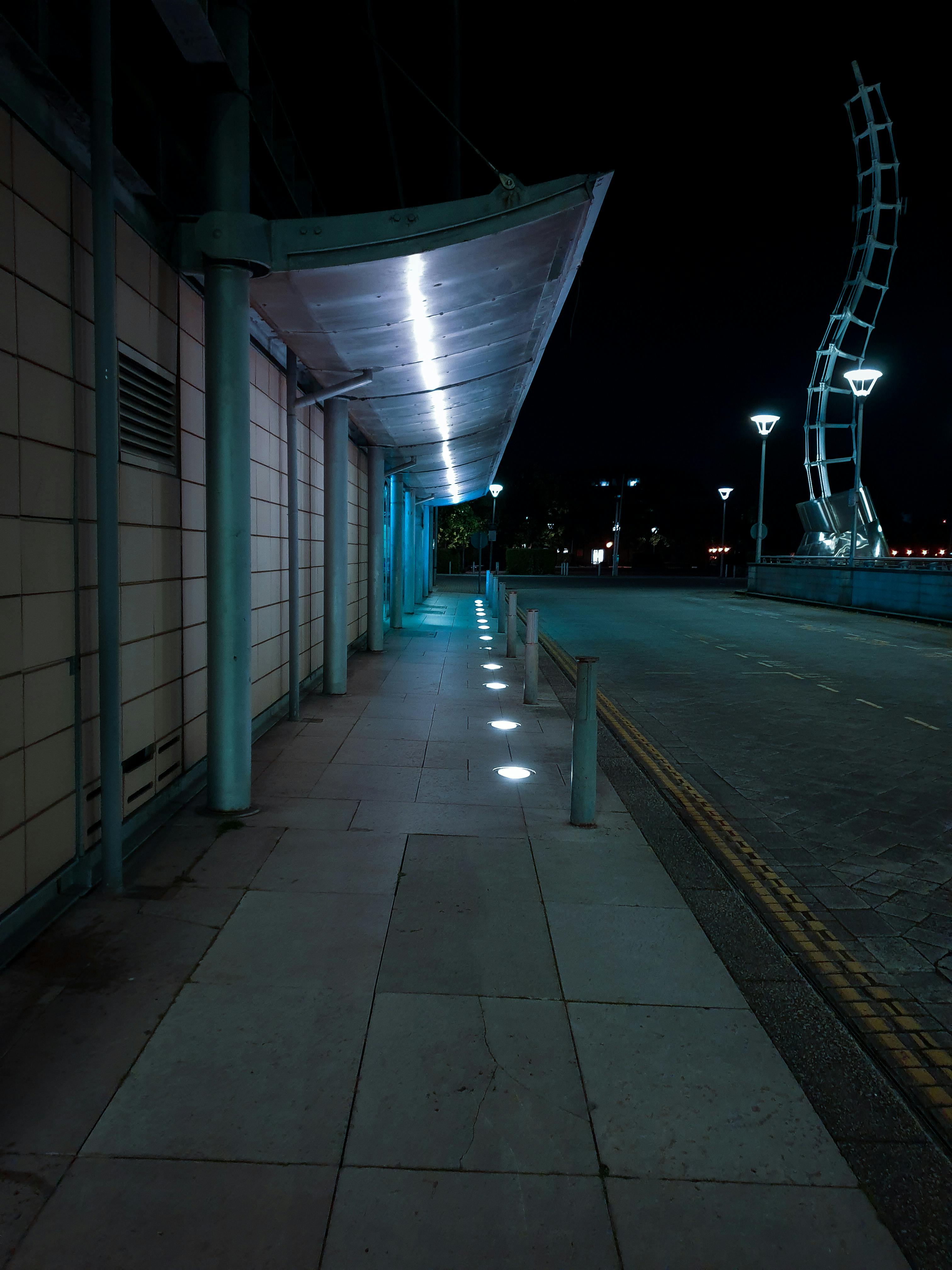 Sidewalk Illuminated at Night · Free Stock Photo