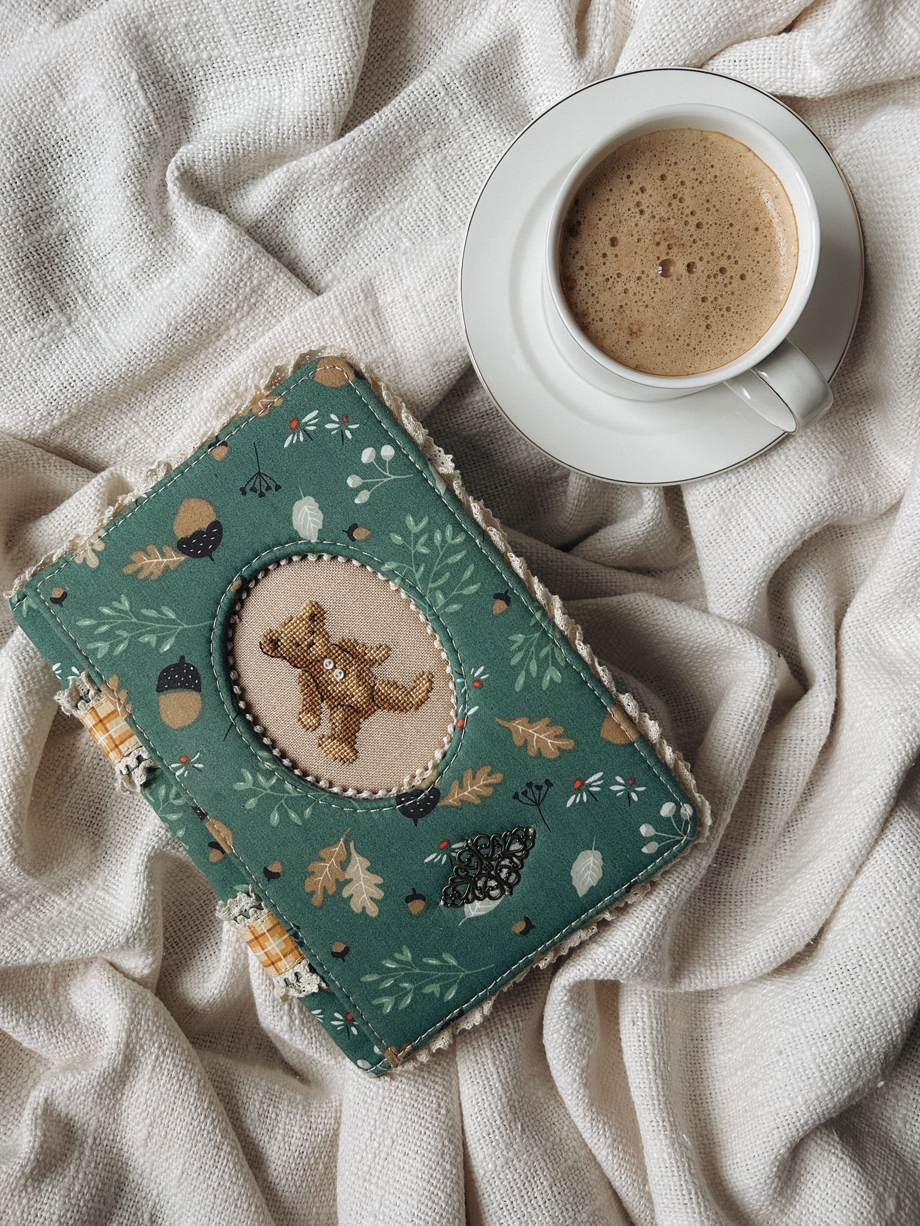 Notebook and a Cup of Coffee · Free Stock Photo