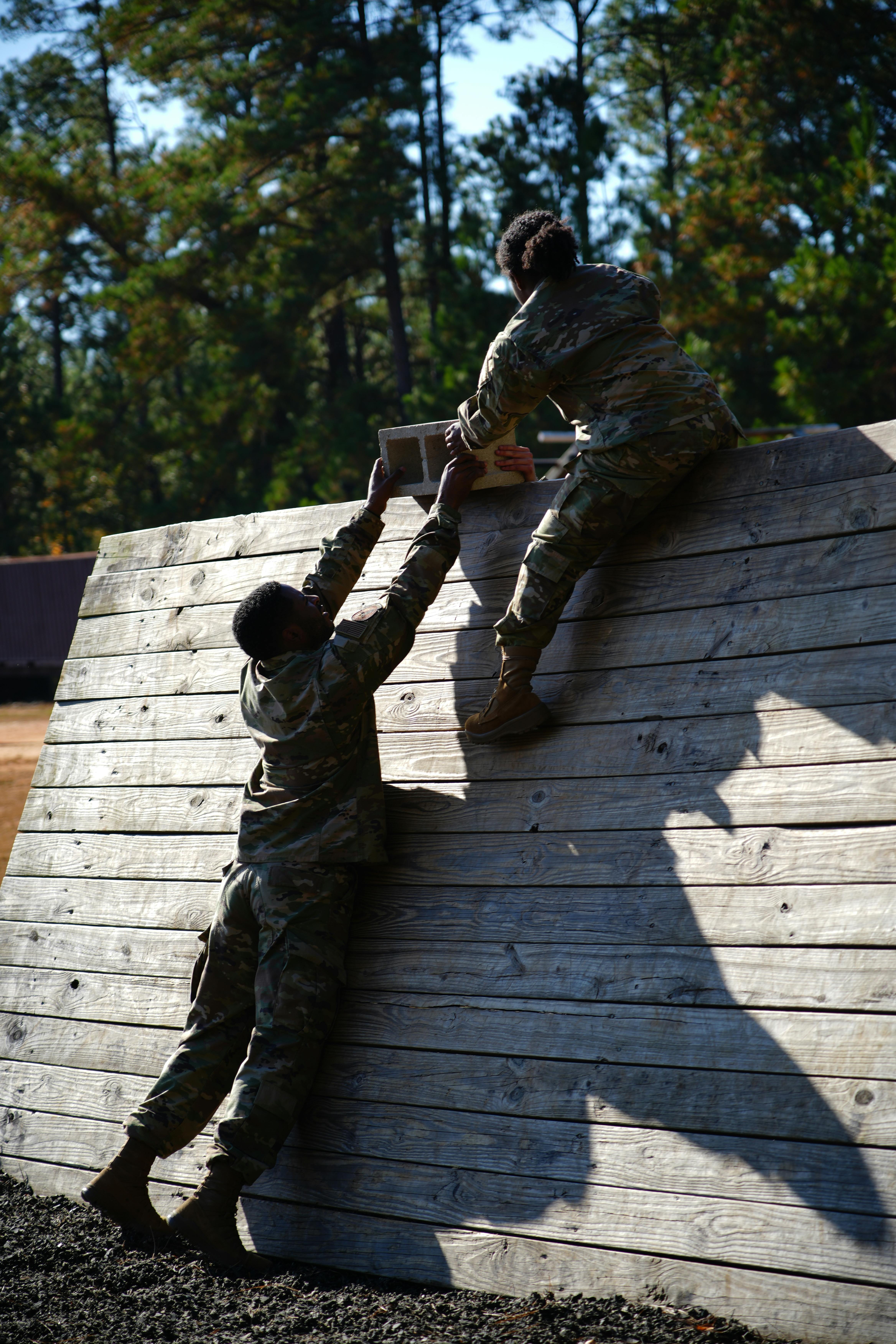 Soldiers Climbing Wooden Wall · Free Stock Photo