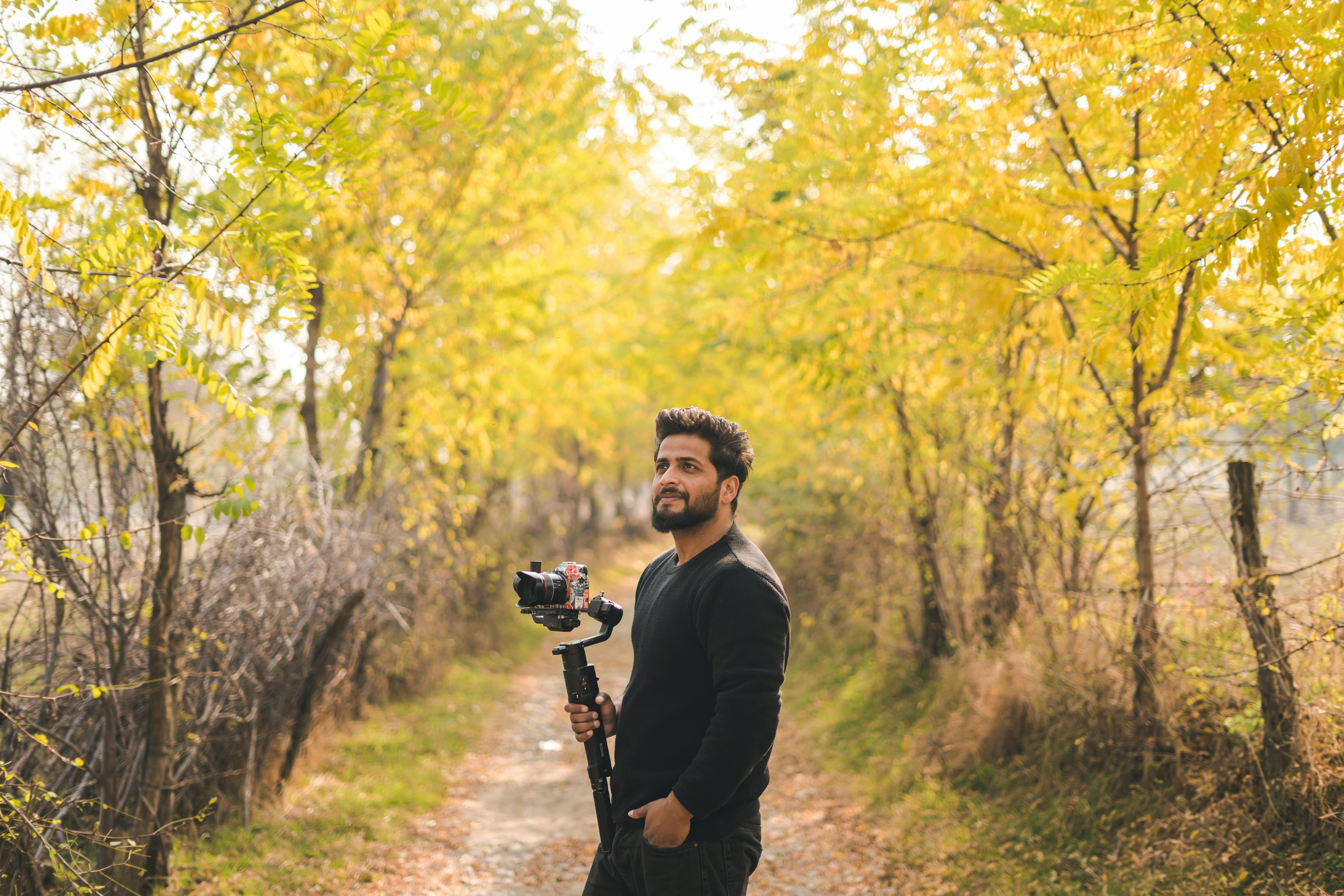Bearded Photographer with Camera on Tripod Standing on Footpath · Free ...