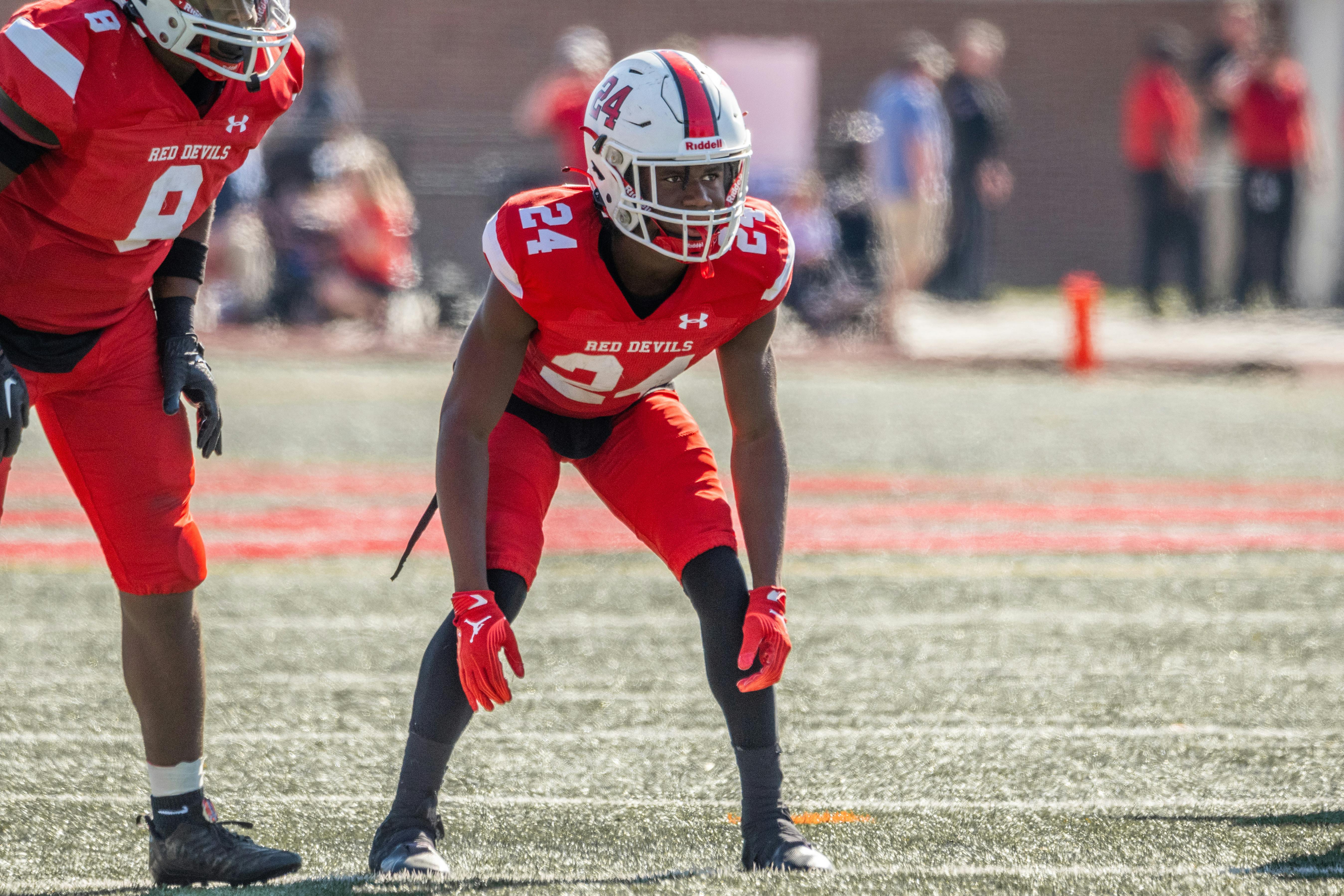 Man in Red and White Roos 5 Football Jersey Playing Football · Free ...