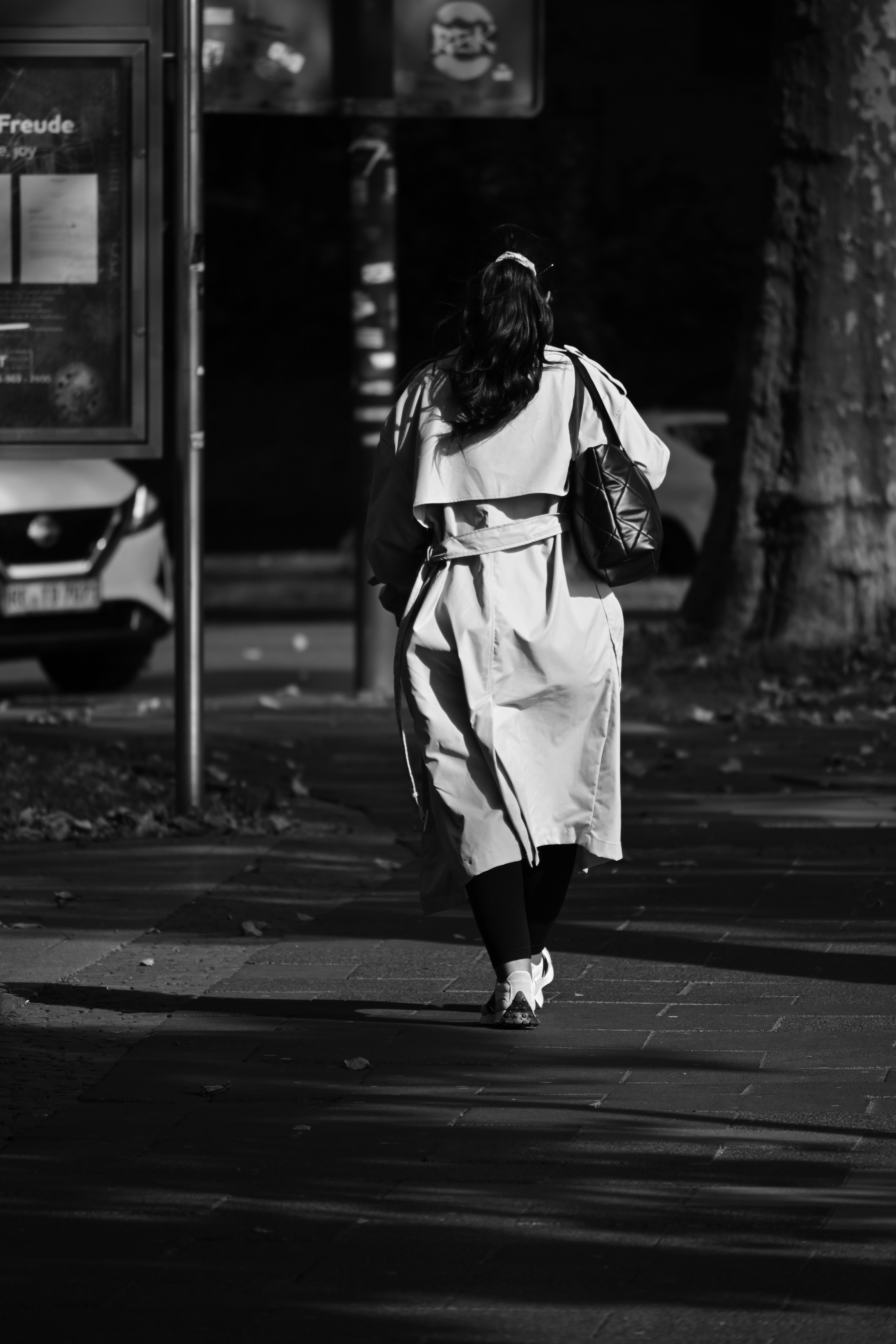 Woman Walking on Sidewalk · Free Stock Photo