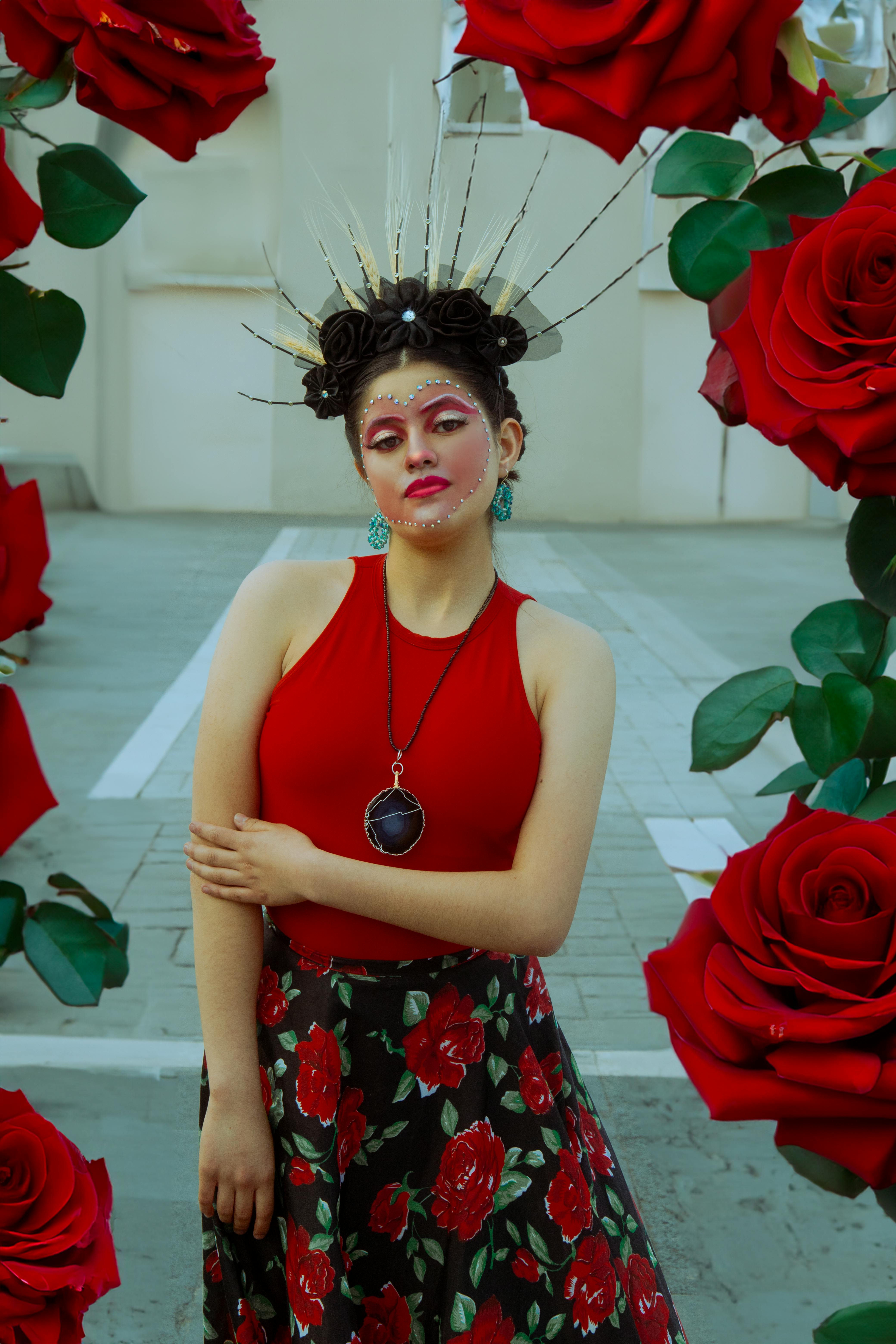 Portrait of Woman with Painted Face and Roses around · Free Stock Photo