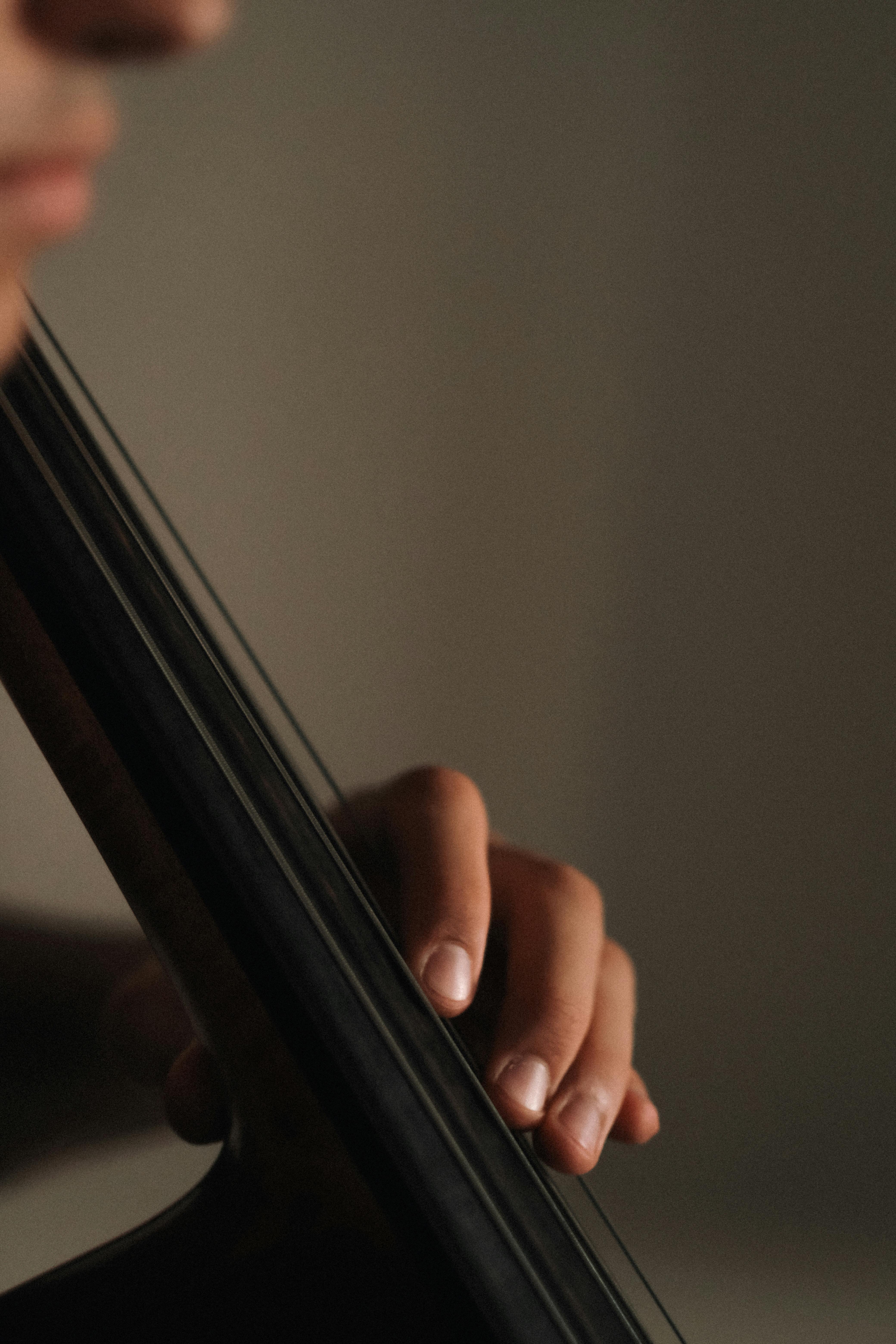 Man Hands on Instrument Cords · Free Stock Photo