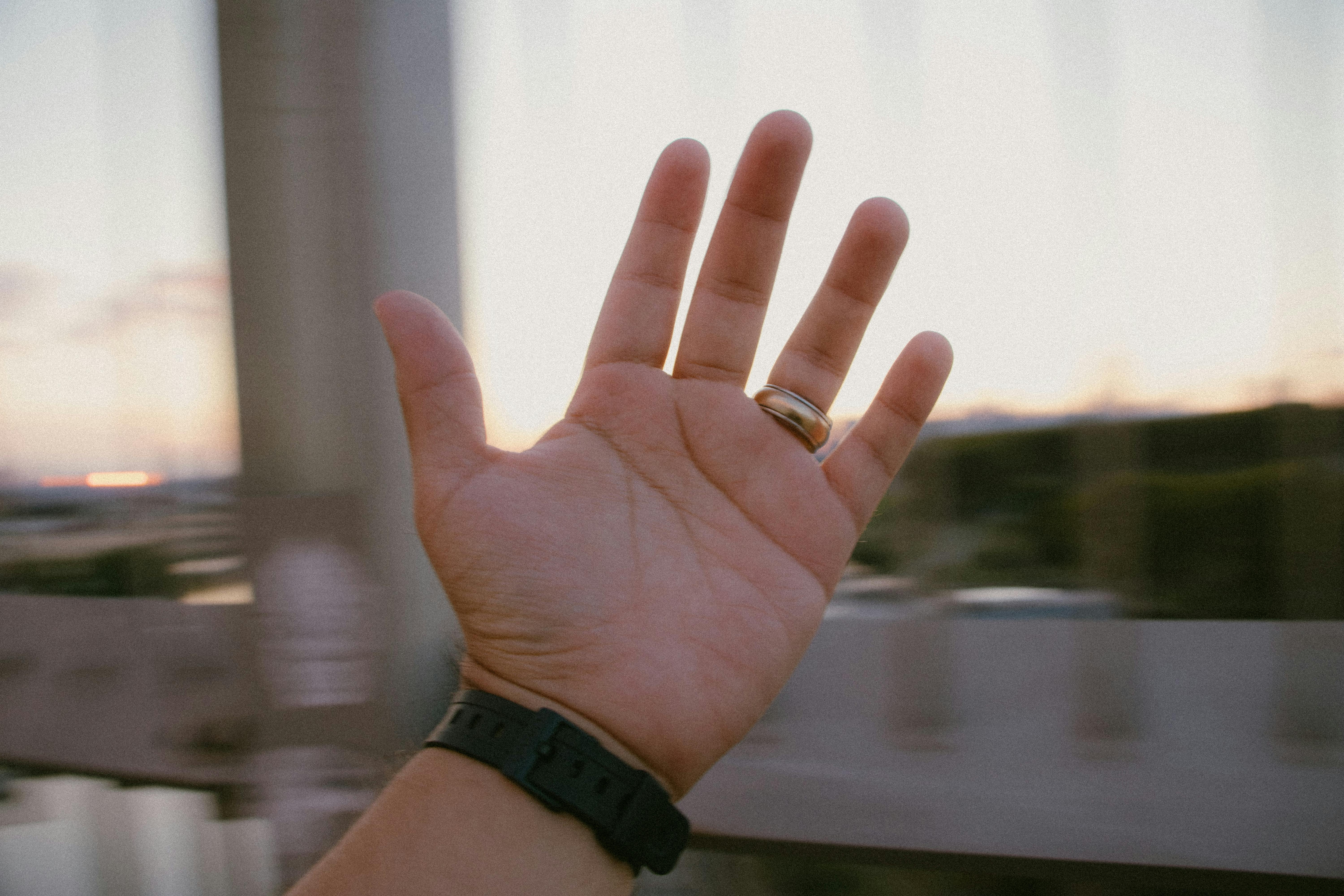 Hand with a Wedding Ring and a Watch · Free Stock Photo