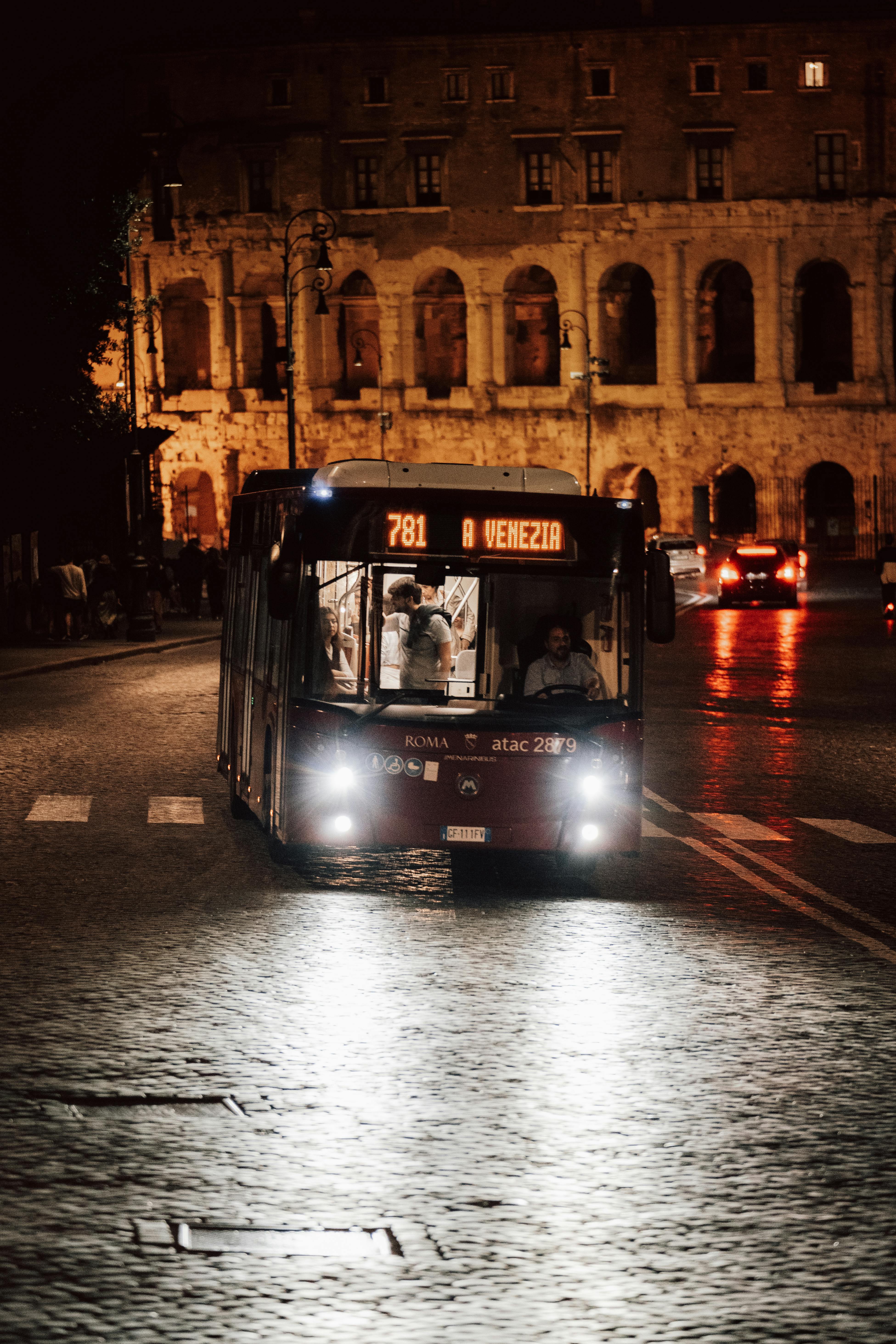 Bus near Colosseum at Night · Free Stock Photo