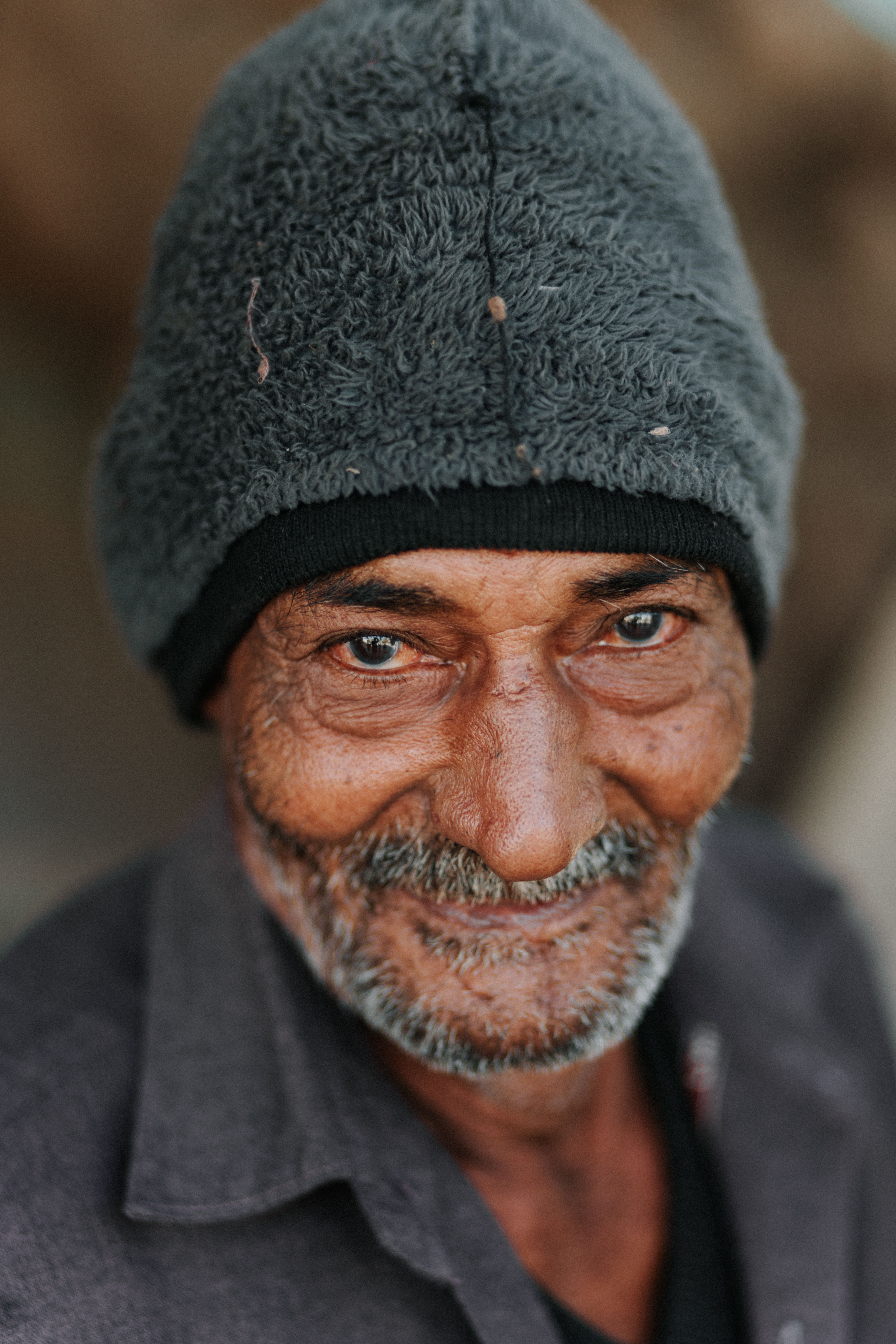 Portrait of an Elderly Man Wearing a Cap · Free Stock Photo